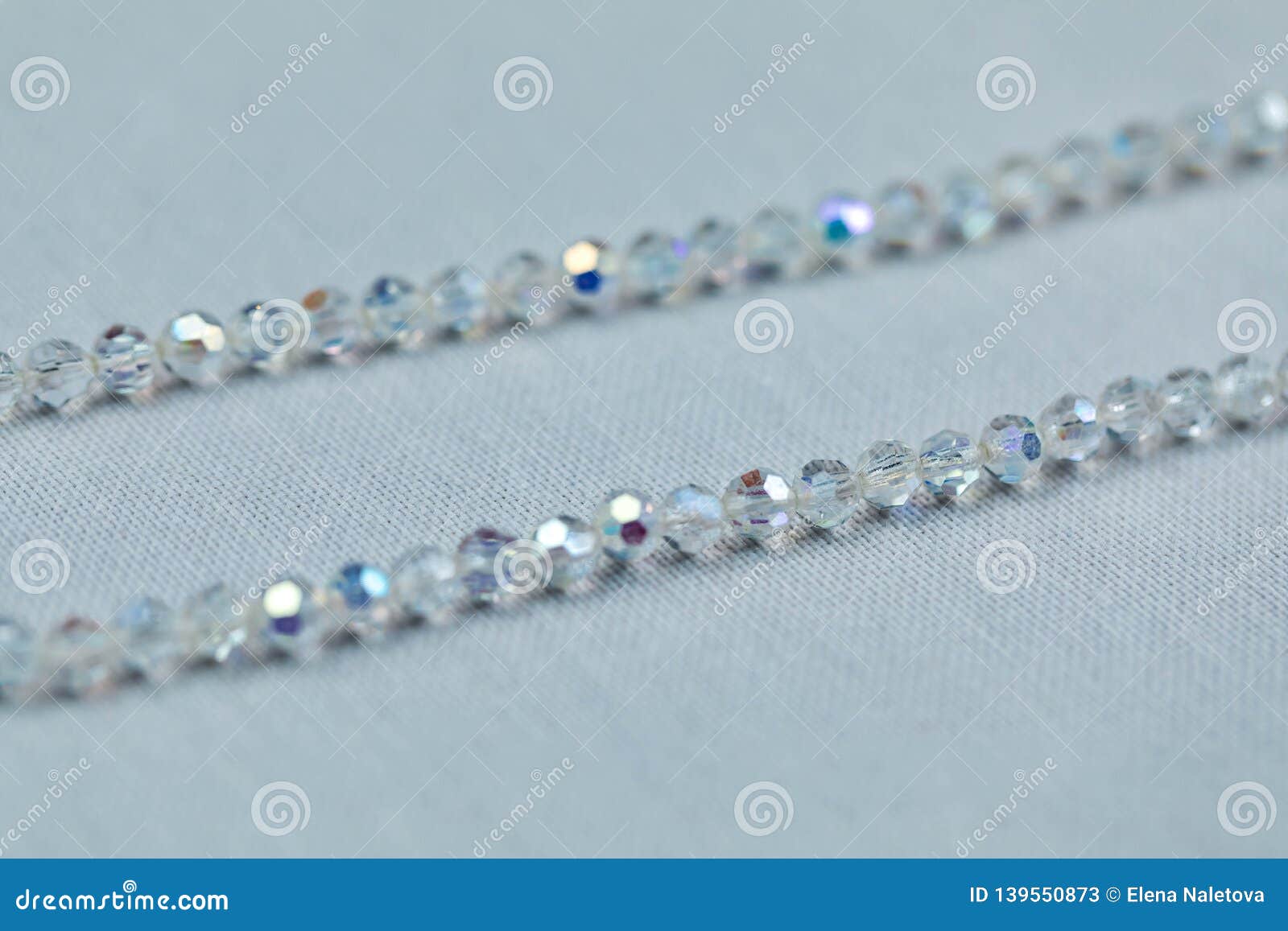Two Strings of a Glass Beads with a Set of Sides on Rough Monophonic ...