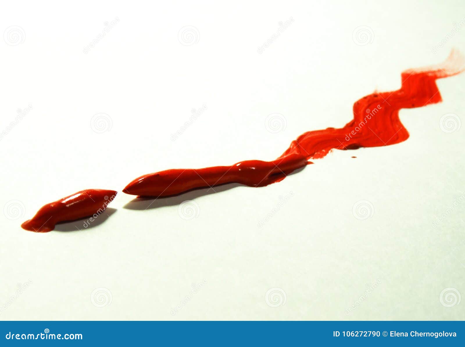 Two strips of red paint. stock photo. Image of tube - 106272790