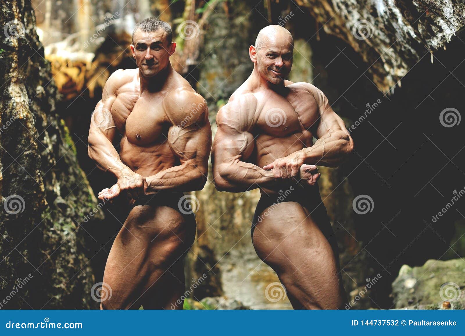 Two Strong Bodybuilders Posing Outdoors Stock Photo - Image of concept, cellulite: 144737532