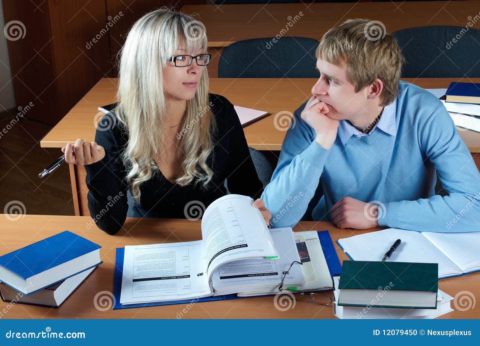 Two student in classroom stock photo. Image of college - 12079450