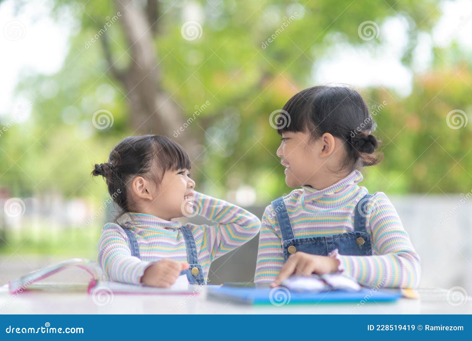 Two Student Little Asian Girls Reading the Book on Table Stock Image ...