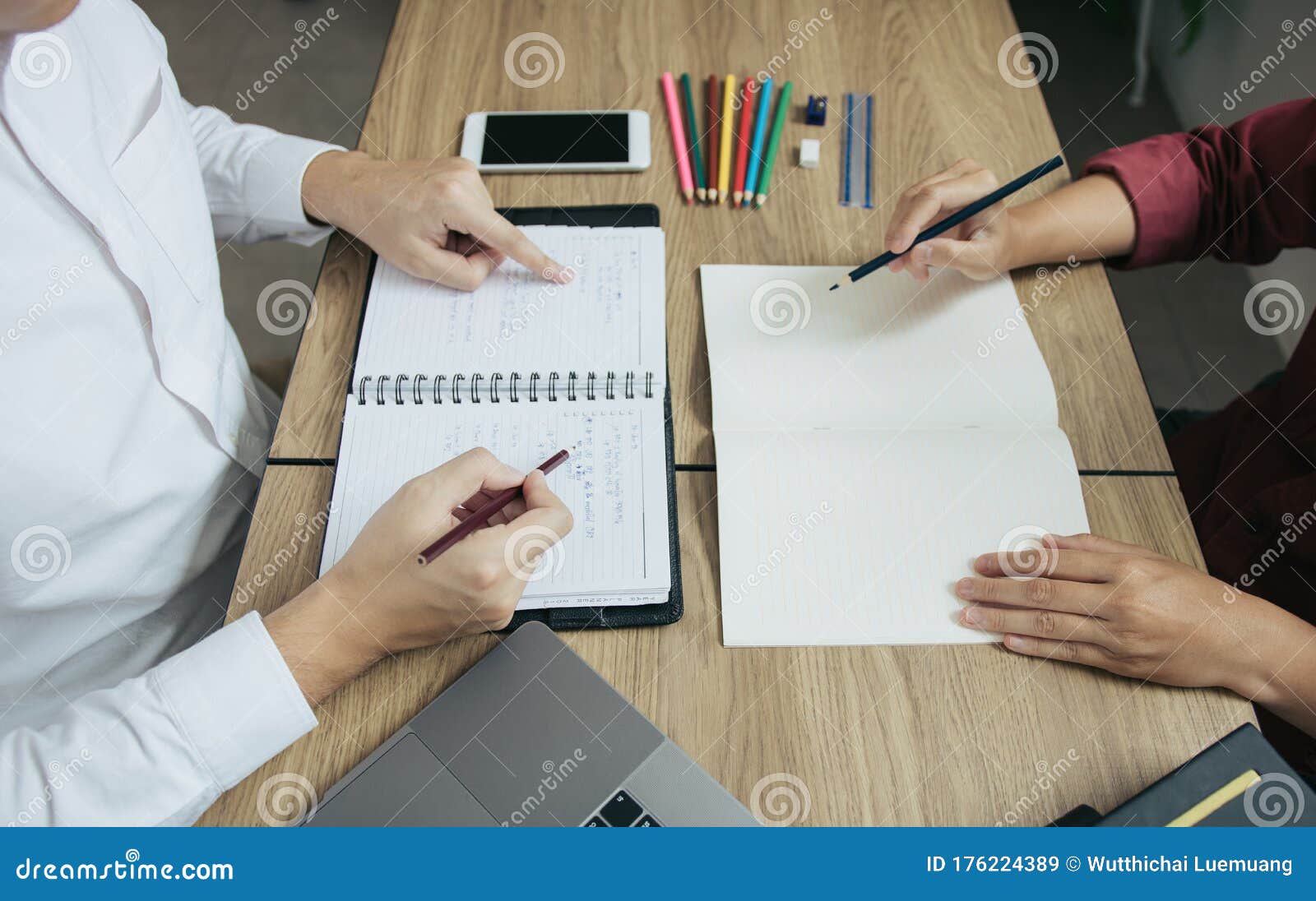 Two Student Reading Textbook for Test Together in Library Stock Image ...