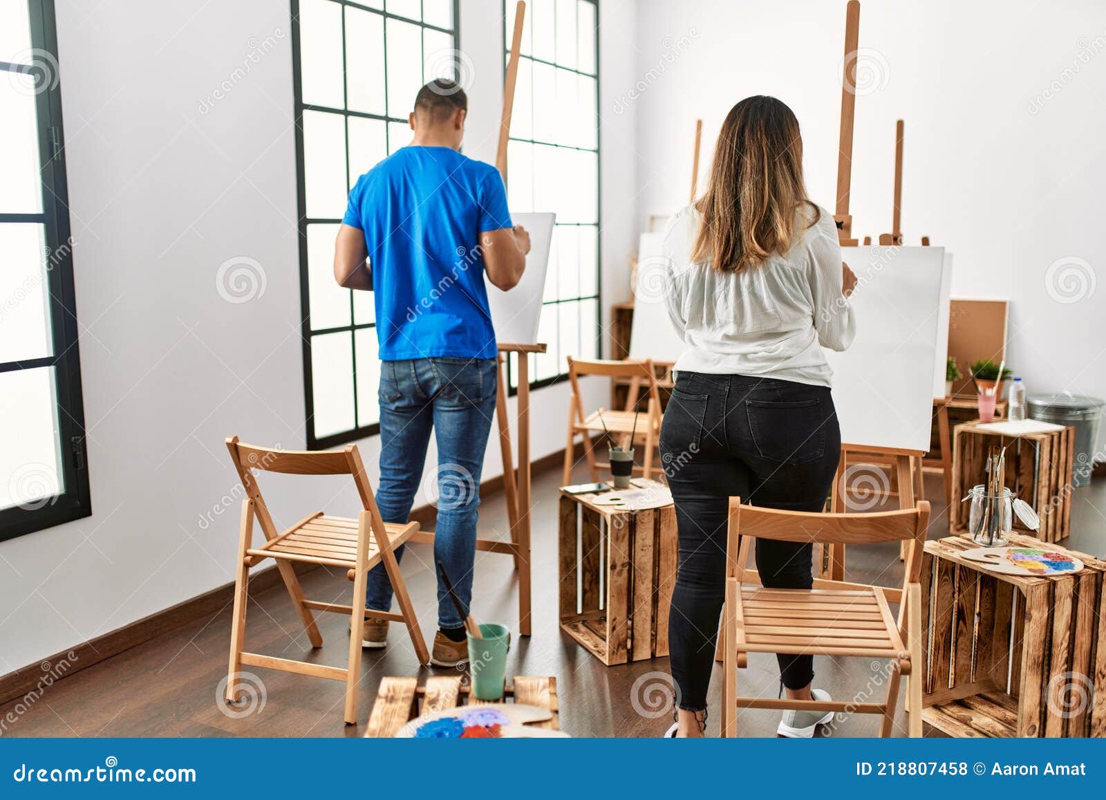 Two Students on Back View Painting at Art School Stock Photo - Image of ...