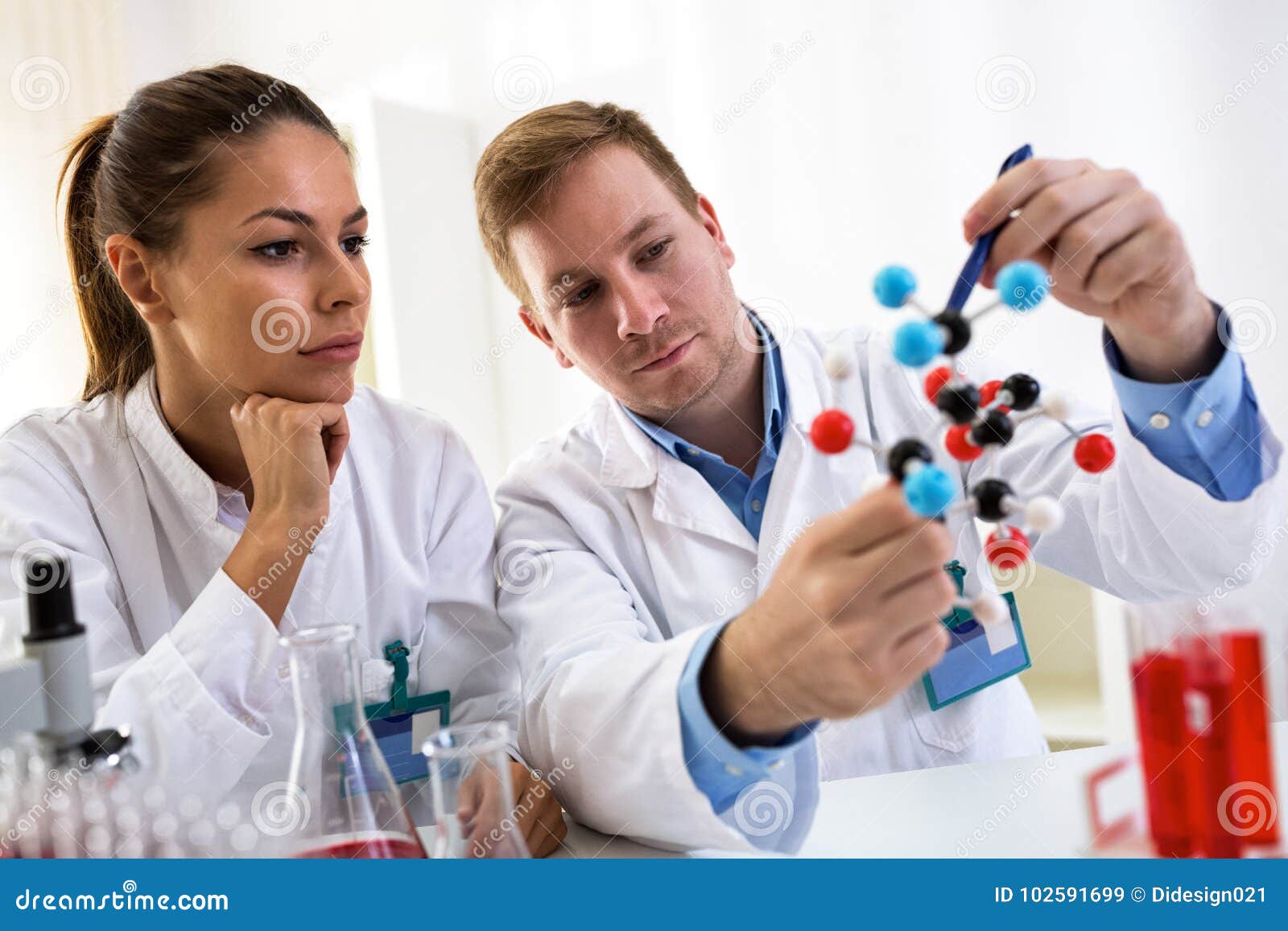 Two Students of Chemistry Looking at Molecular Model and Making Stock ...