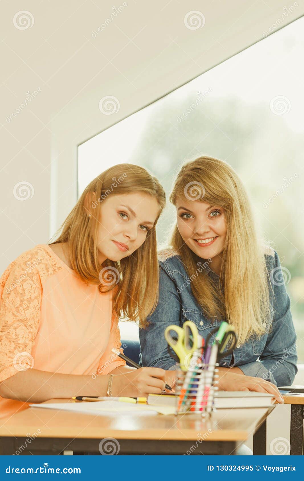 Two students in class stock image. Image of development - 130324995