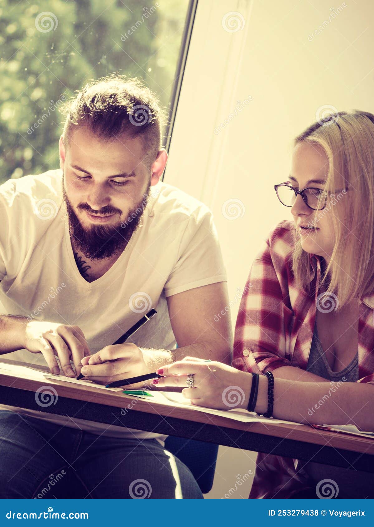 Two students in class stock photo. Image of lifestyle - 253279438