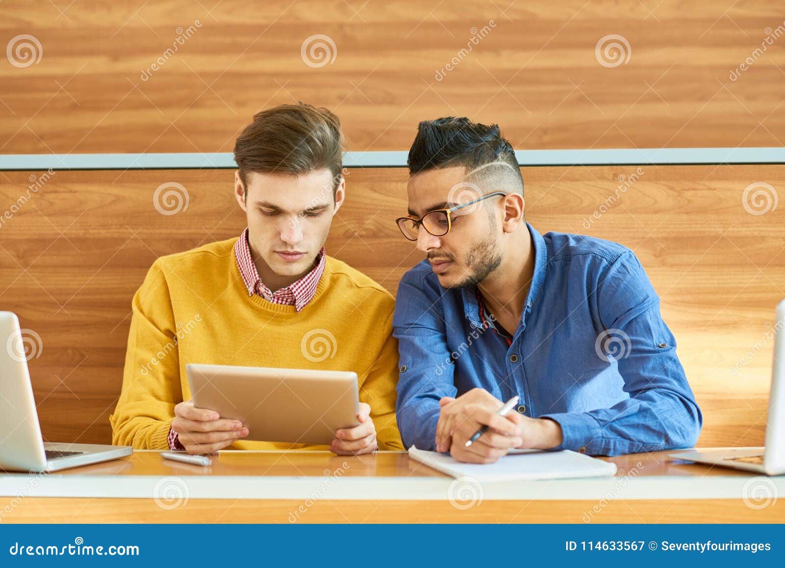 Two Students in College stock image. Image of multiethnic - 114633567