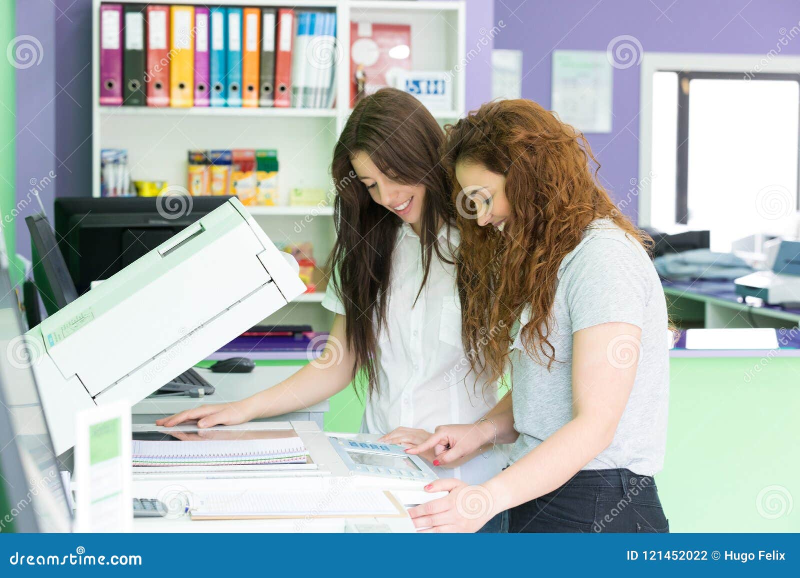 Young Students at a Copy Center Stock Photo - Image of page ...