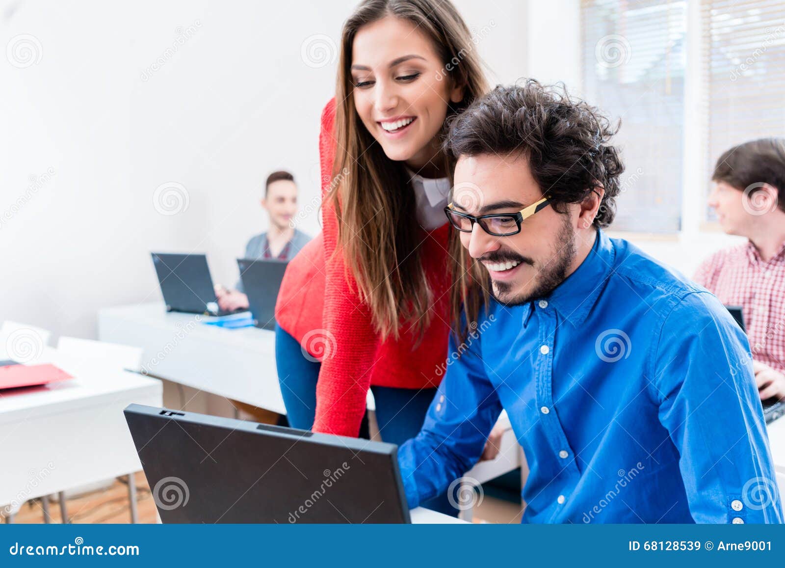 Two Students Discussing Their Work in College Stock Image - Image of ... Two Students Discussing Their Work in College Stock Image - Image of ...