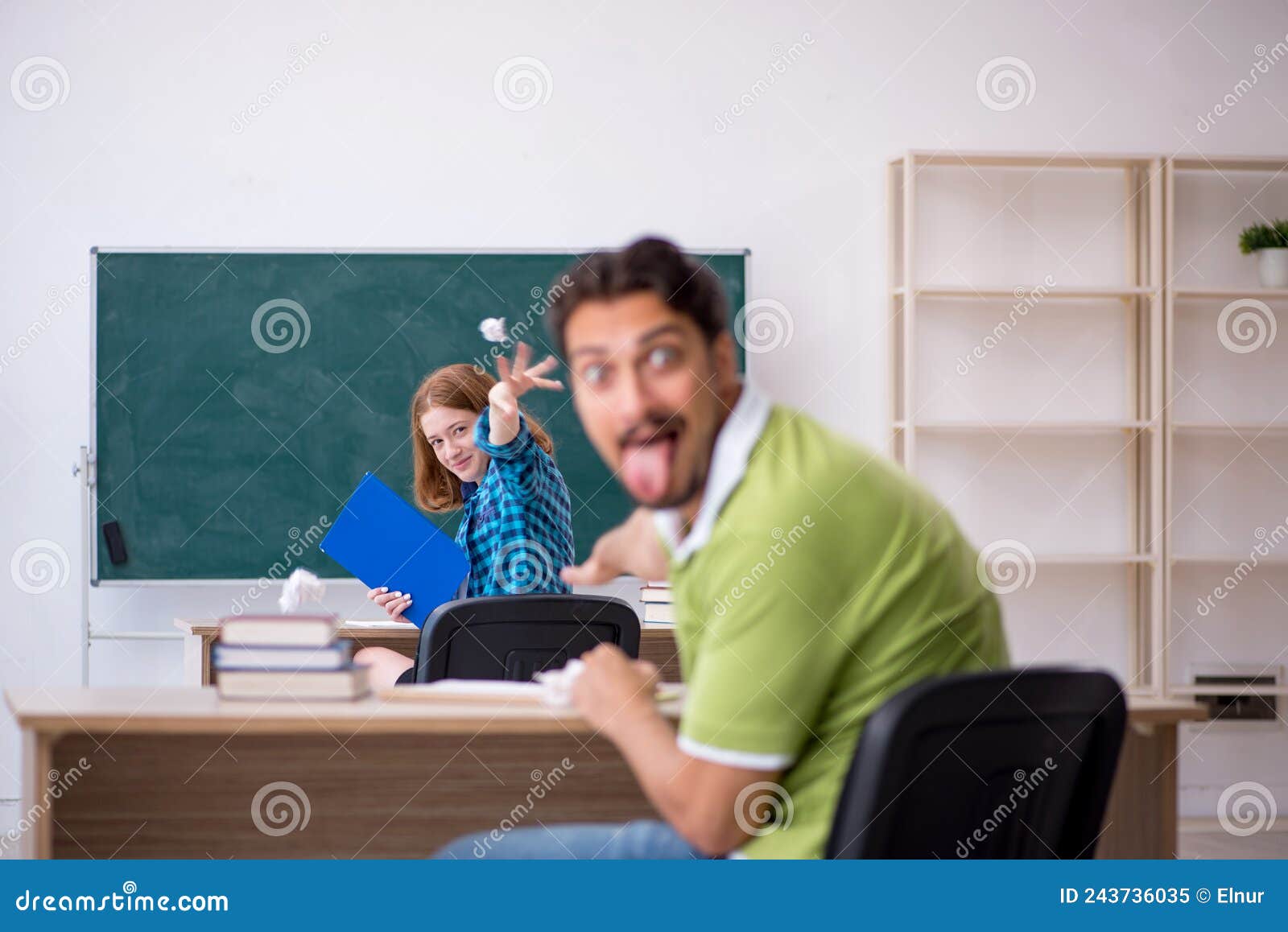 Two Students Having Fun in the Classroom Stock Image - Image of class ...