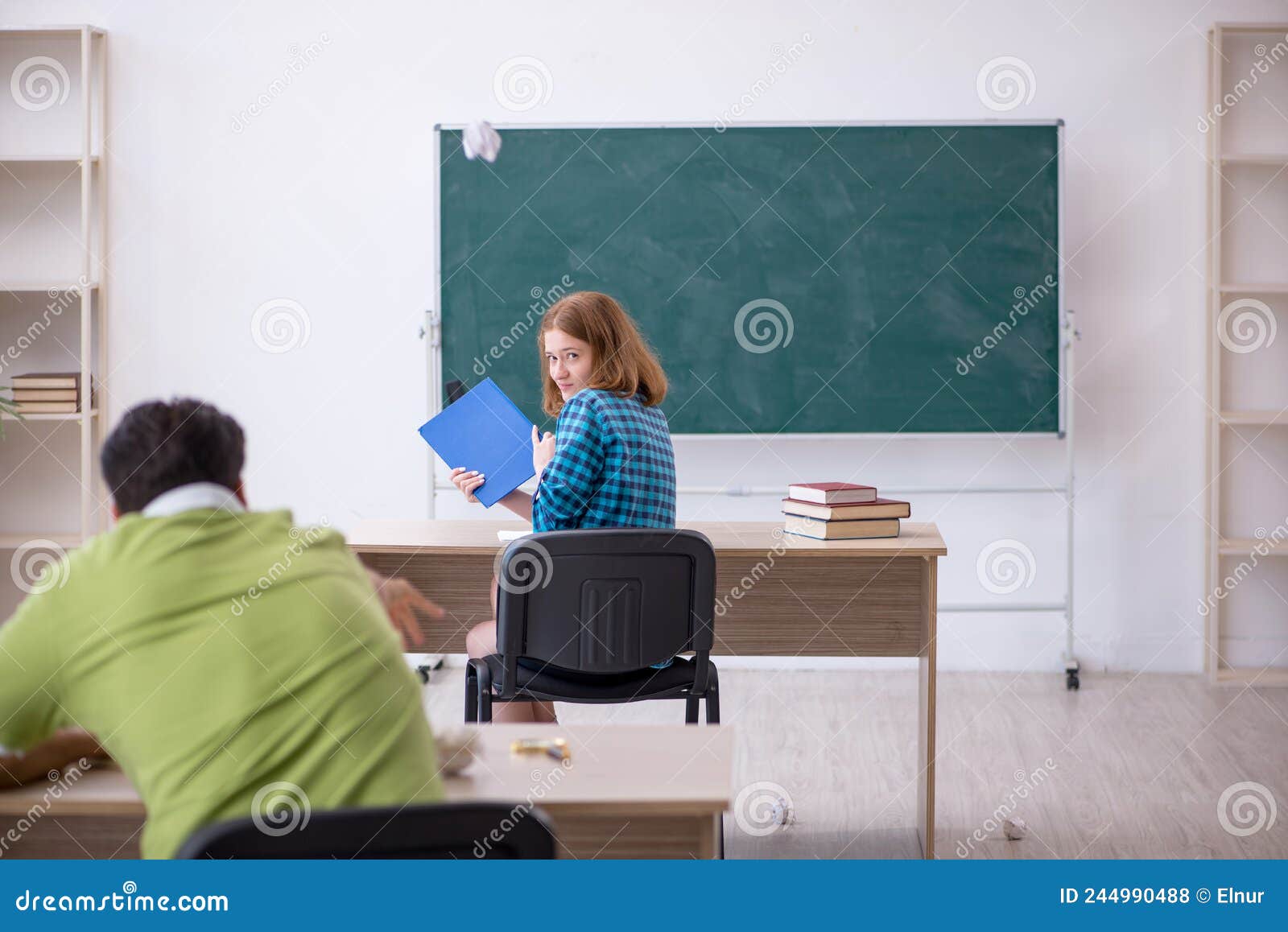 Two Students Having Fun in the Classroom Stock Photo - Image of creased ...
