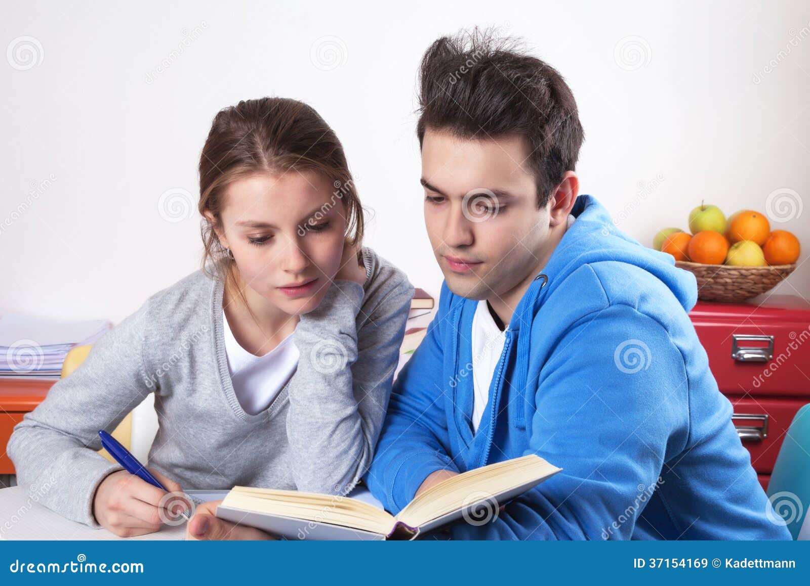 Two Students Learning with a Book Stock Image - Image of girl ...