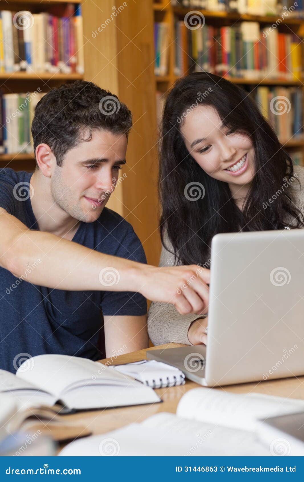 Two Students Learning on the Laptop in a Library Stock Image - Image of ...