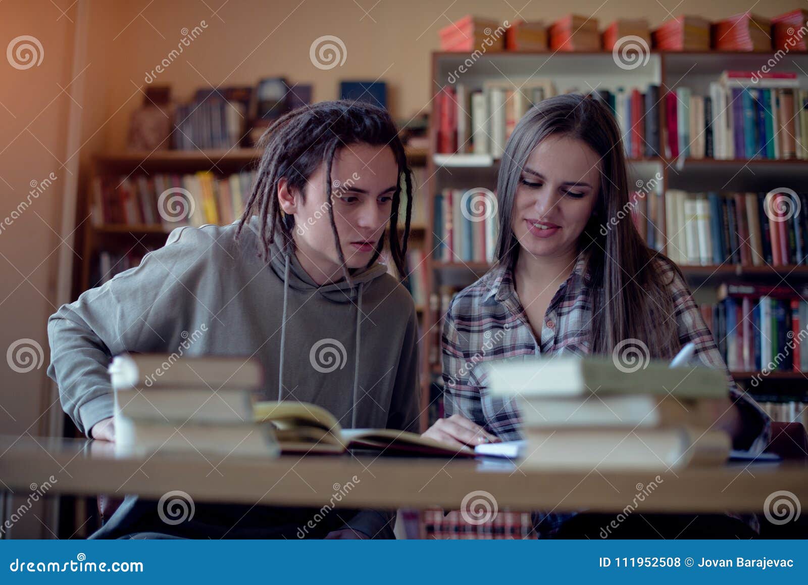 Two Students Learning Together Stock Photo - Image of people, looking ...
