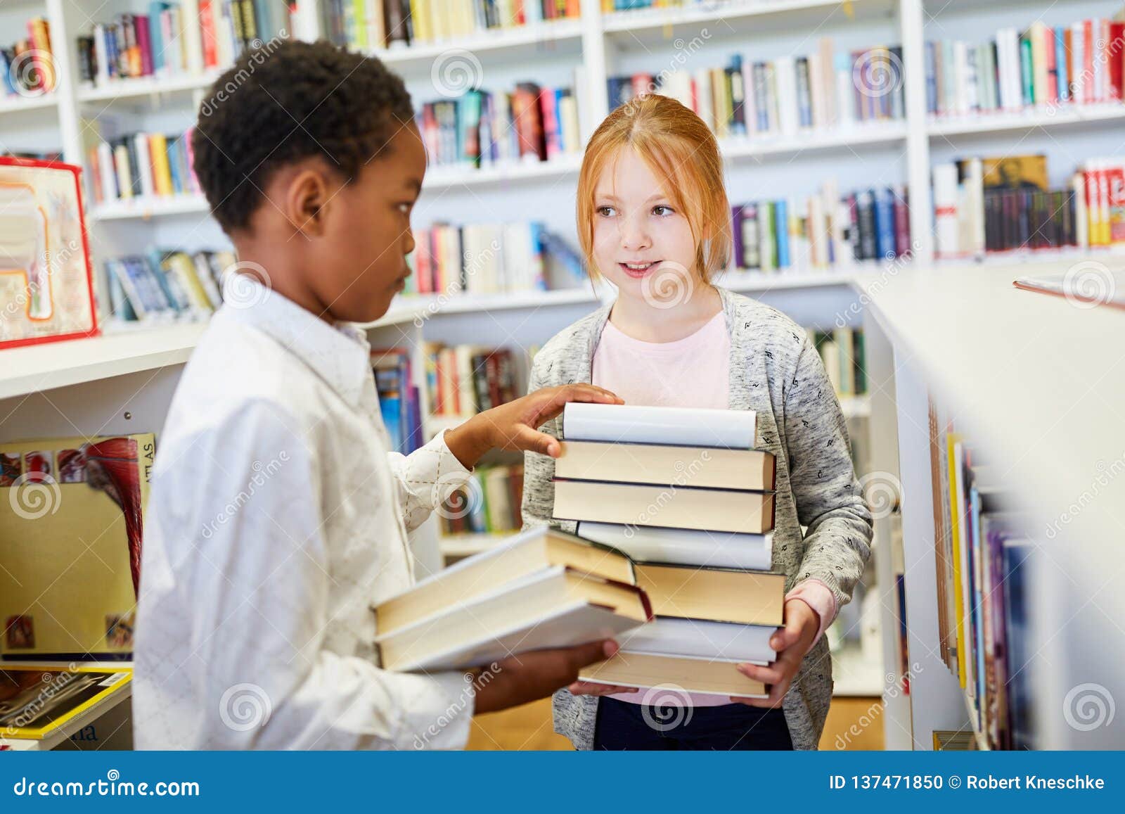 Two Students in the Library Carry Books Stock Photo - Image of public ...