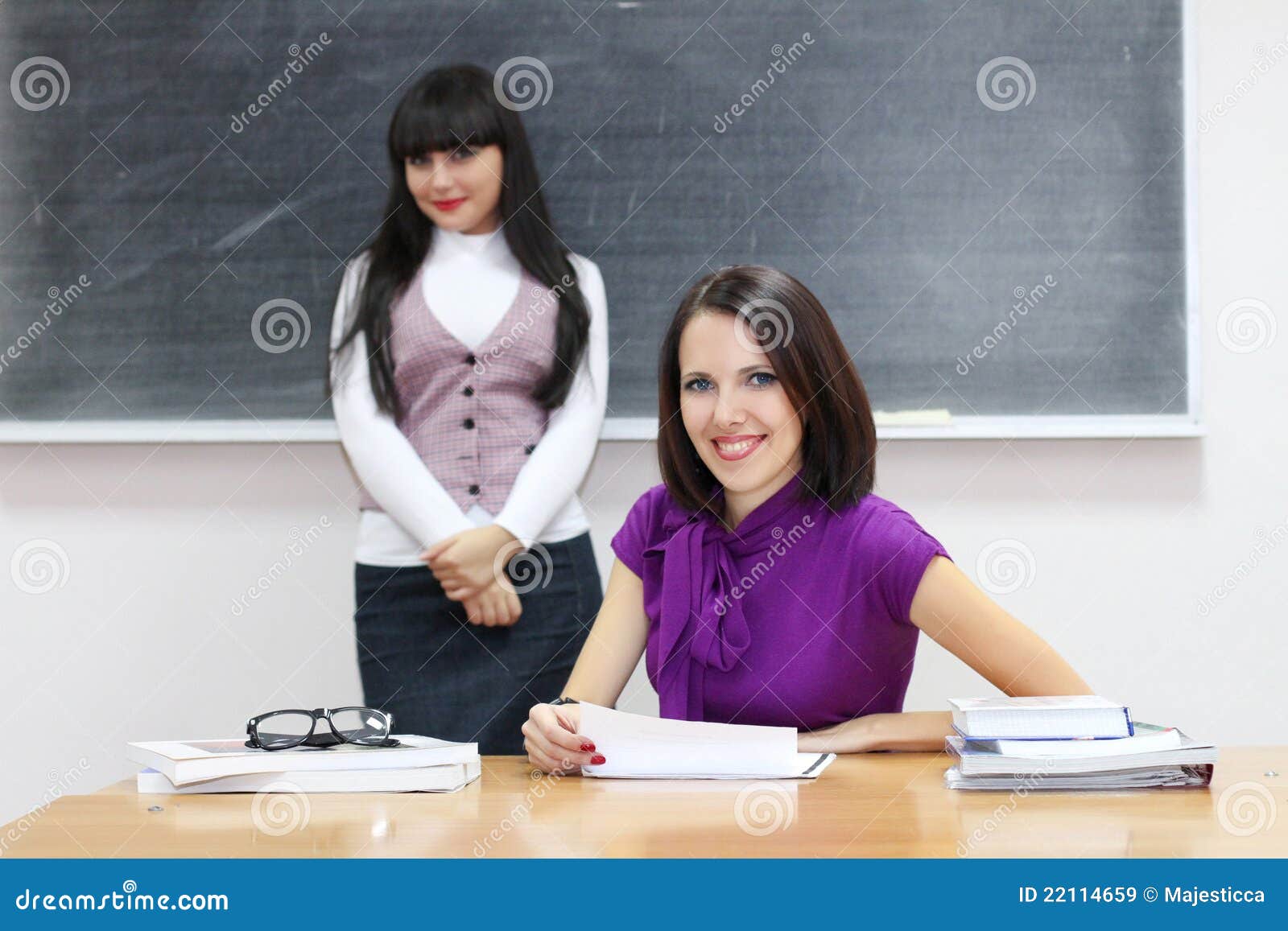 Two Students Near Blackboard Stock Image - Image of desk, blackboard ...
