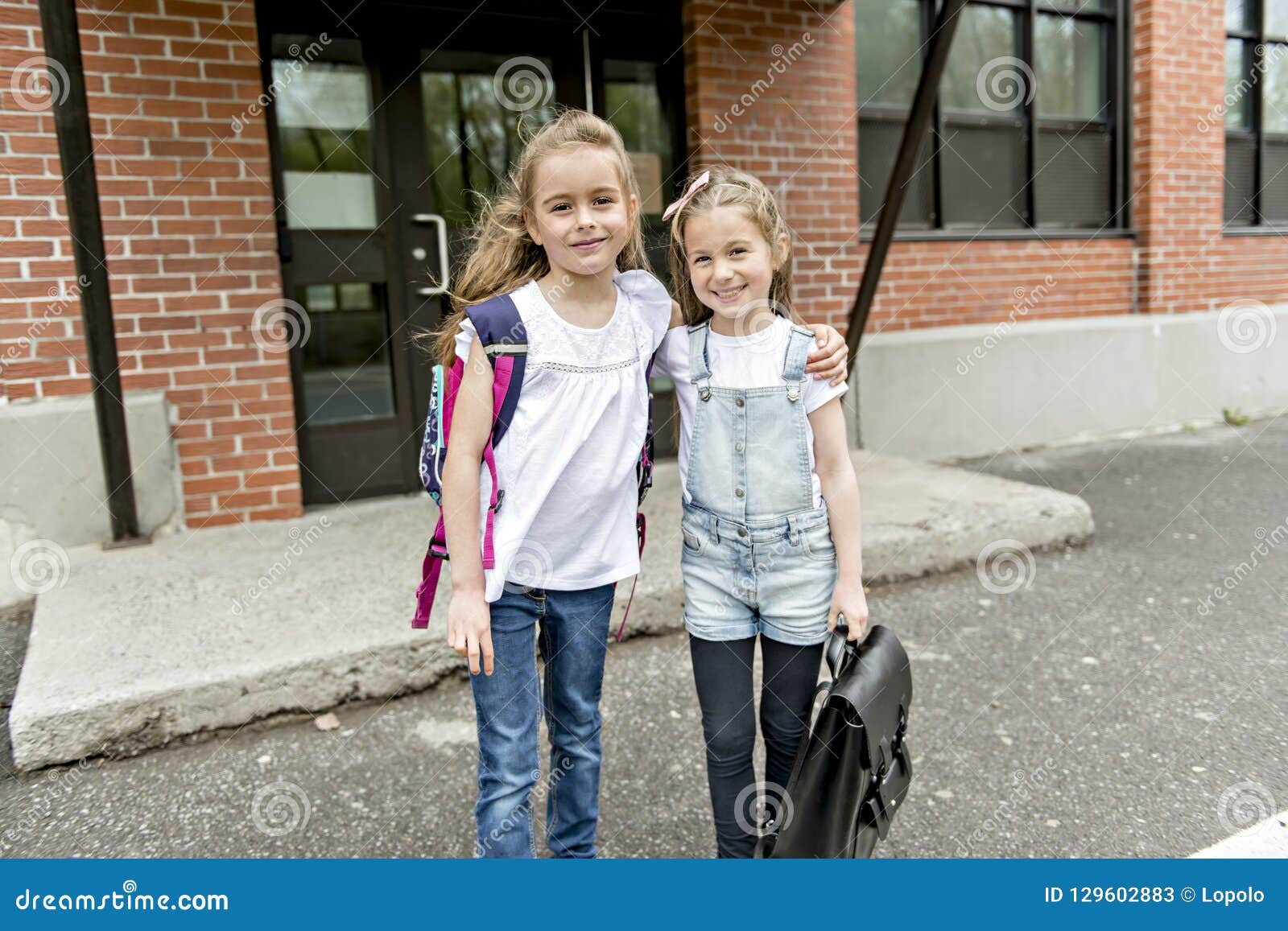 Two Students Outside at School Standing Together Stock Image - Image of ...