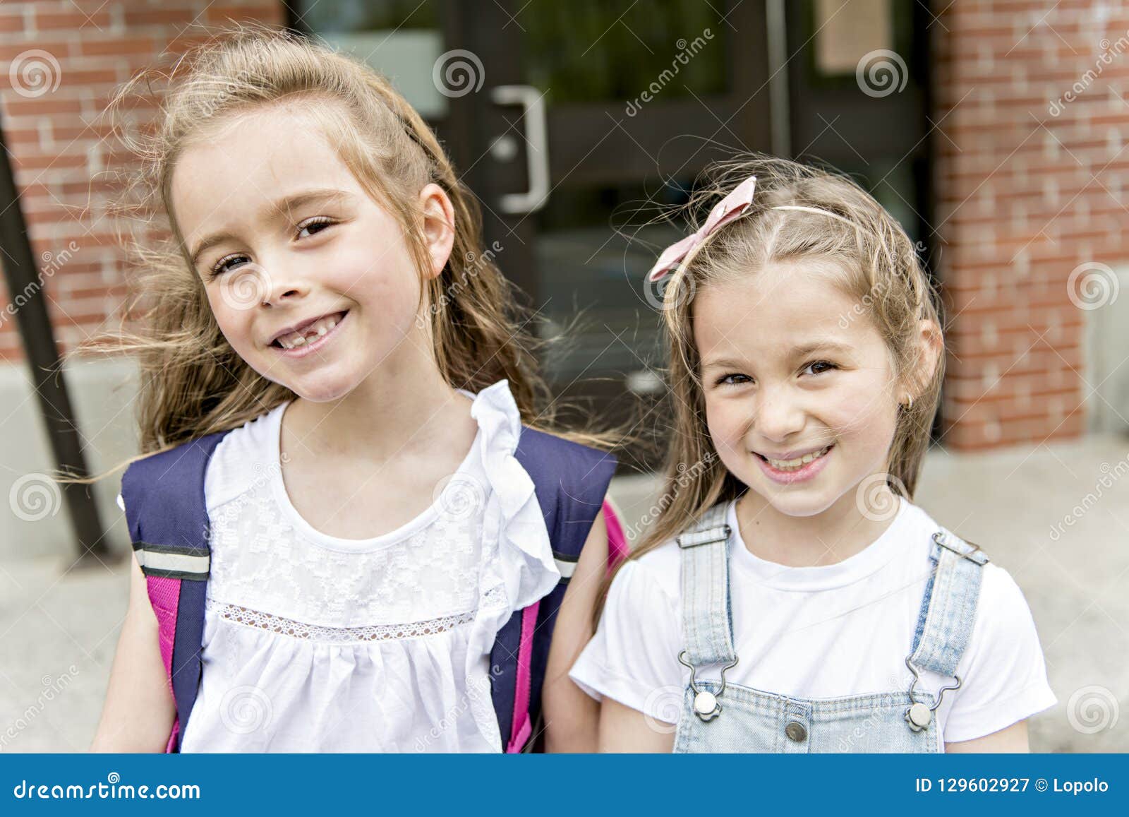 Two Students Outside at School Standing Together Stock Image - Image of ...