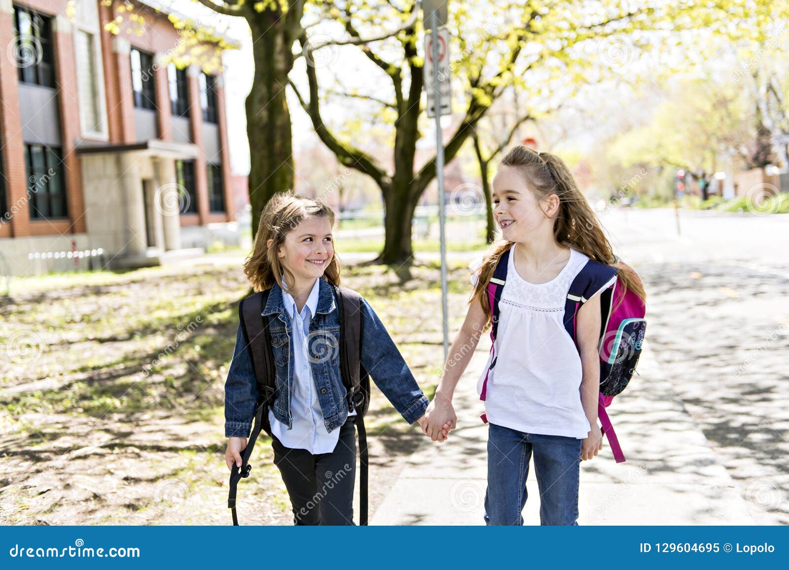 Two Students Outside at School Standing Together Stock Image - Image of ...