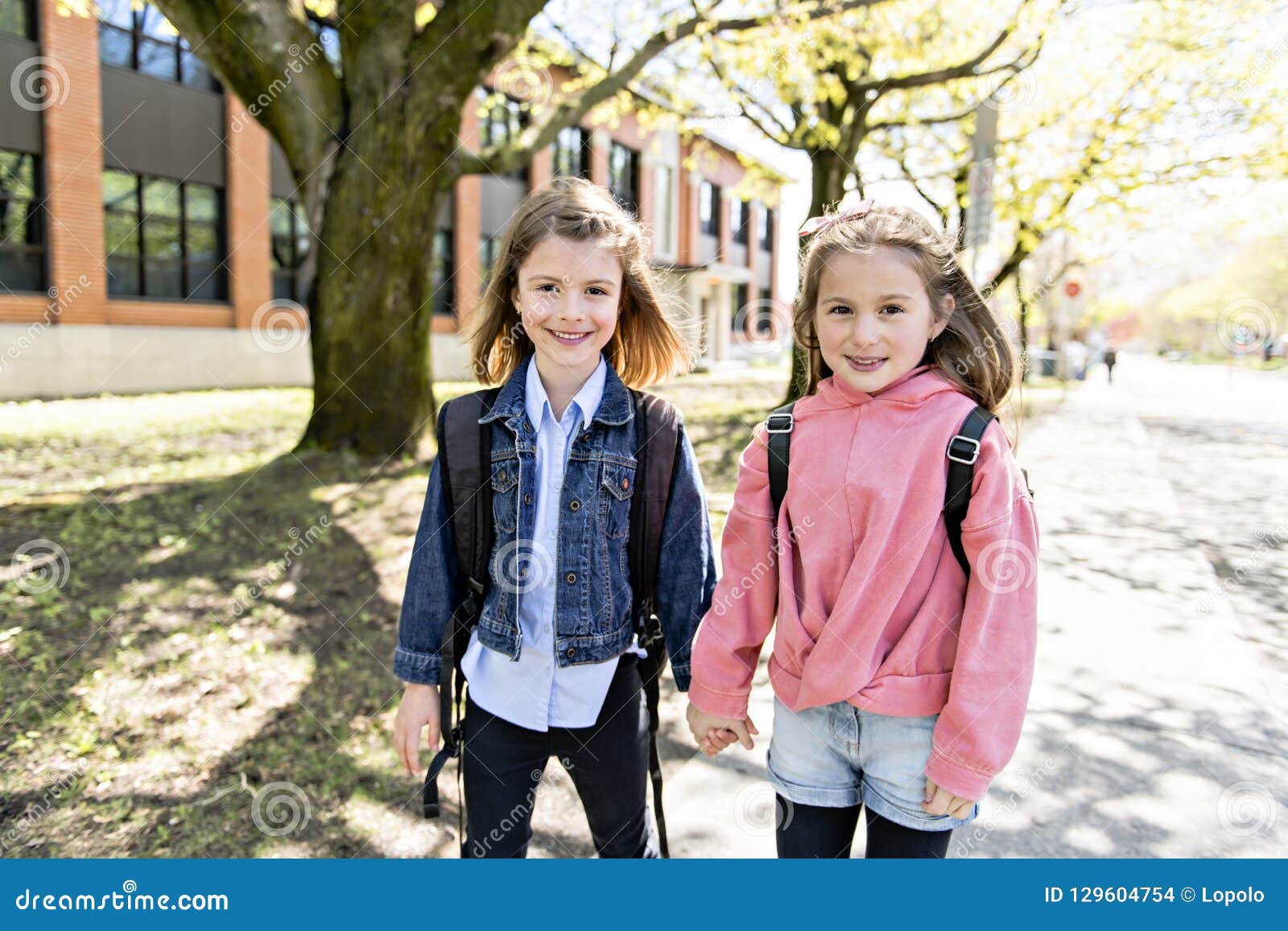 Two Students Outside at School Standing Together Stock Photo - Image of ...