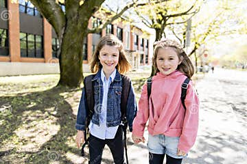 Two Students Outside at School Standing Together Stock Photo - Image of ...