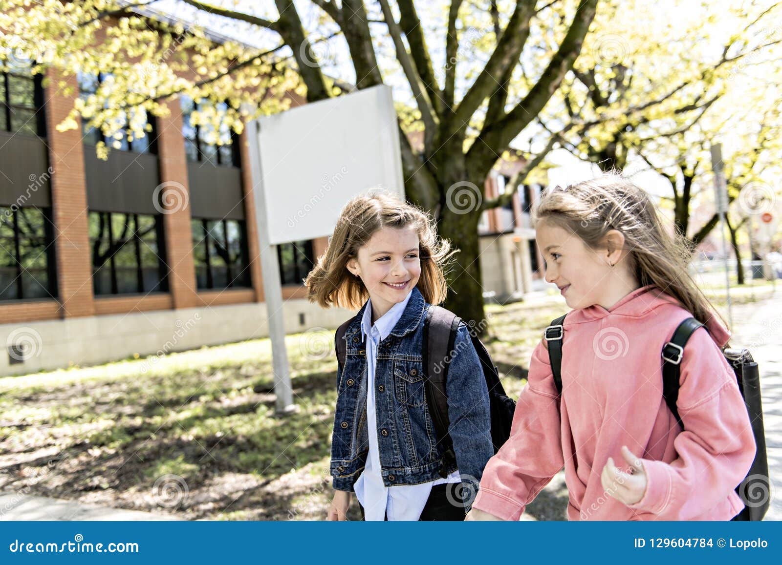 Two Students Outside at School Standing Together Stock Photo - Image of ...