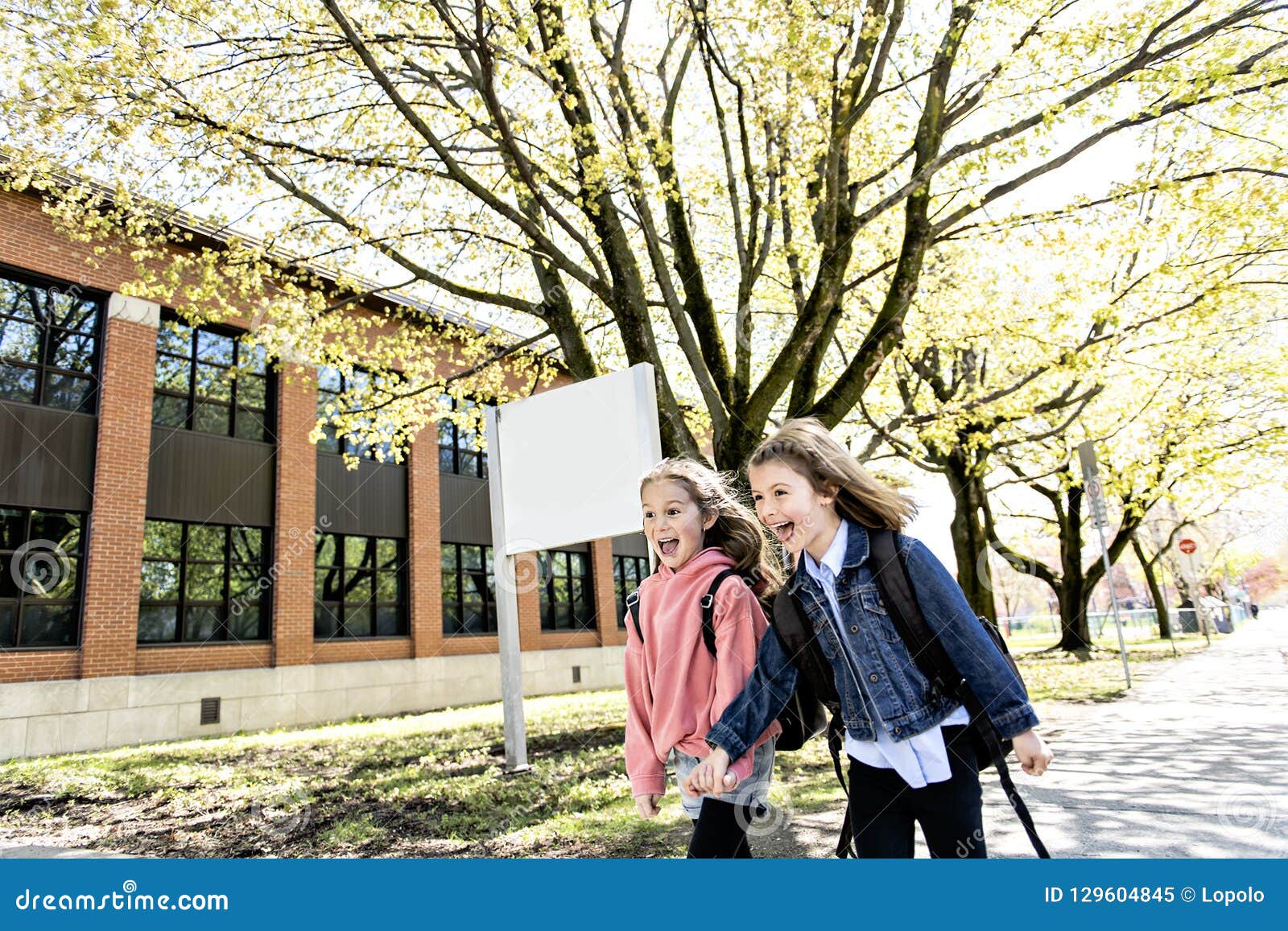 Two Students Outside at School Standing Together Stock Image - Image of ...