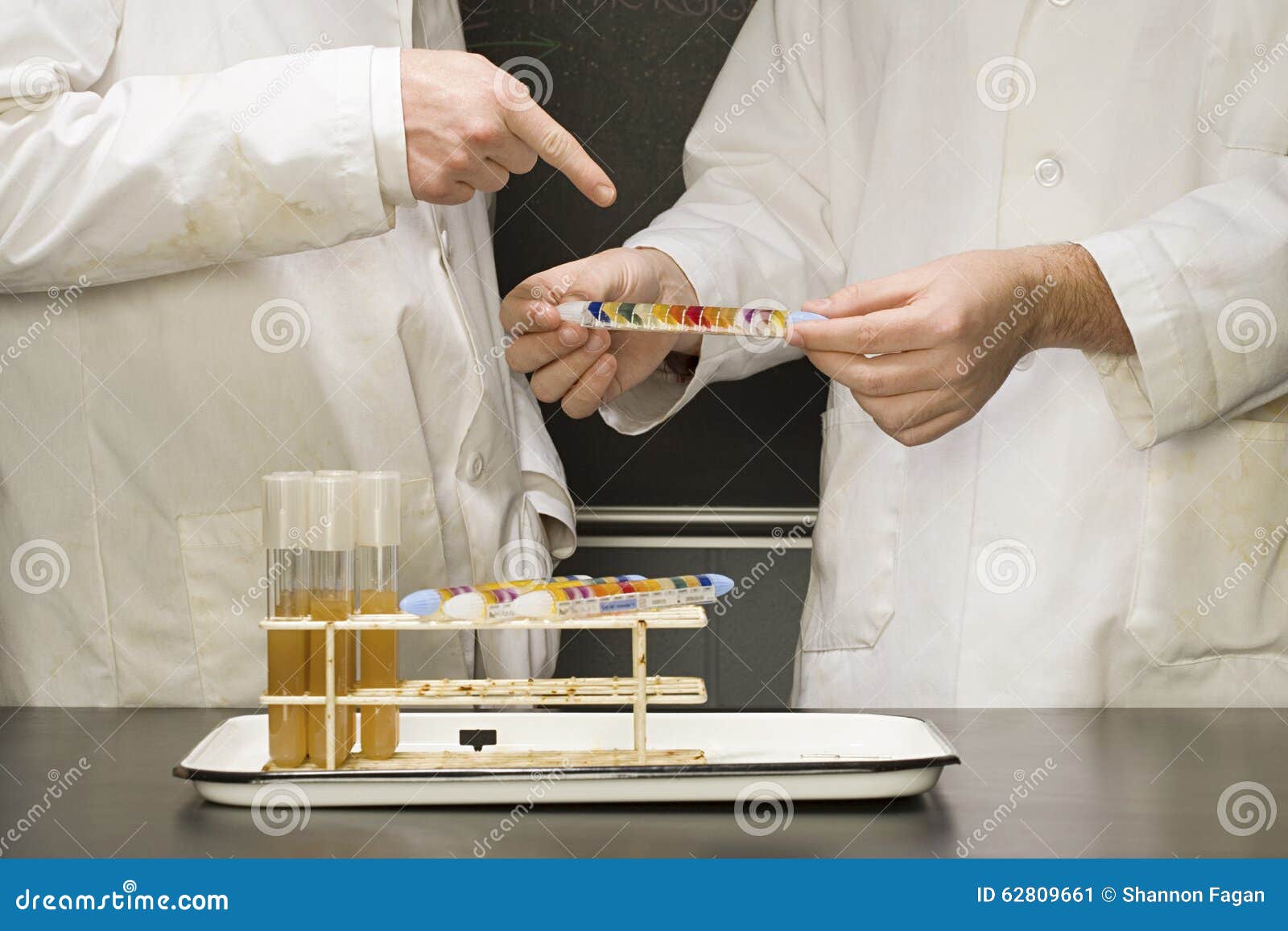 Two Students Performing an Experiment Stock Image - Image of desk ...