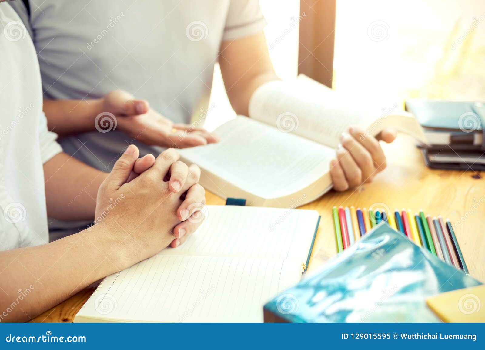Two Students Reading from Books in Library at the University. Stock ...