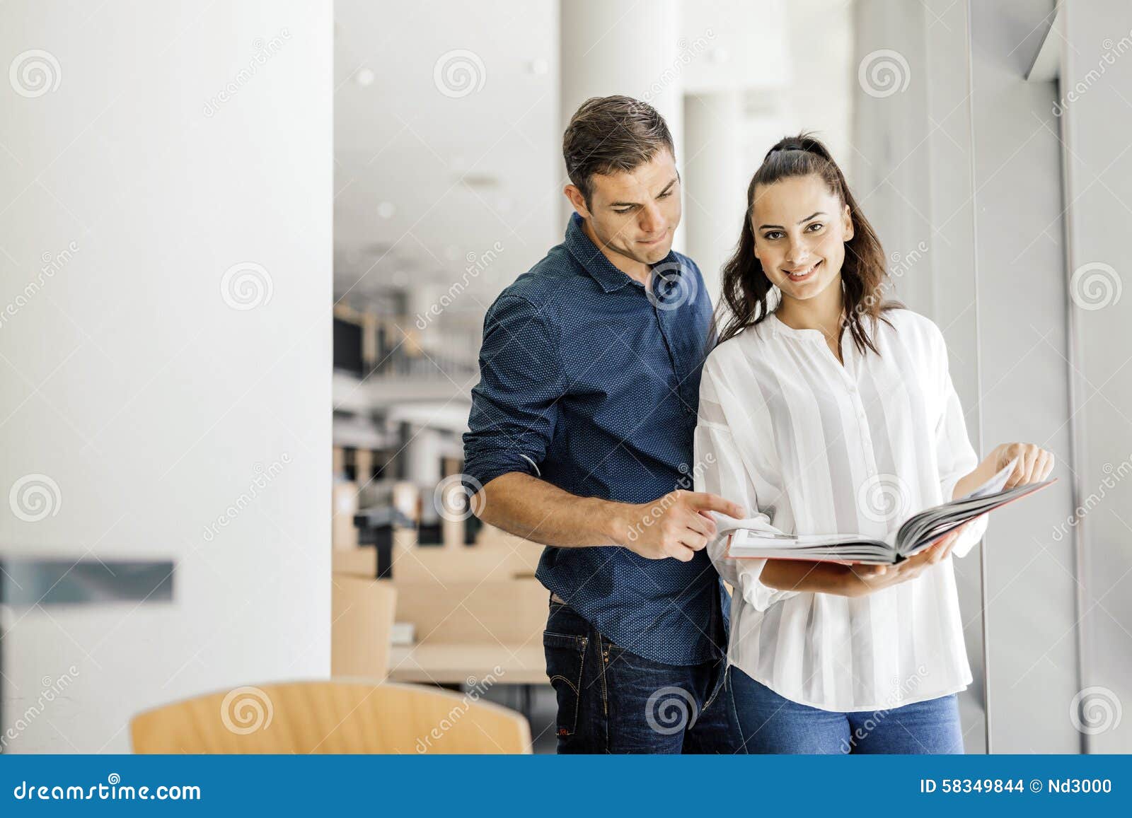 Two Students Reading and Studying in Library Stock Photo - Image of ...