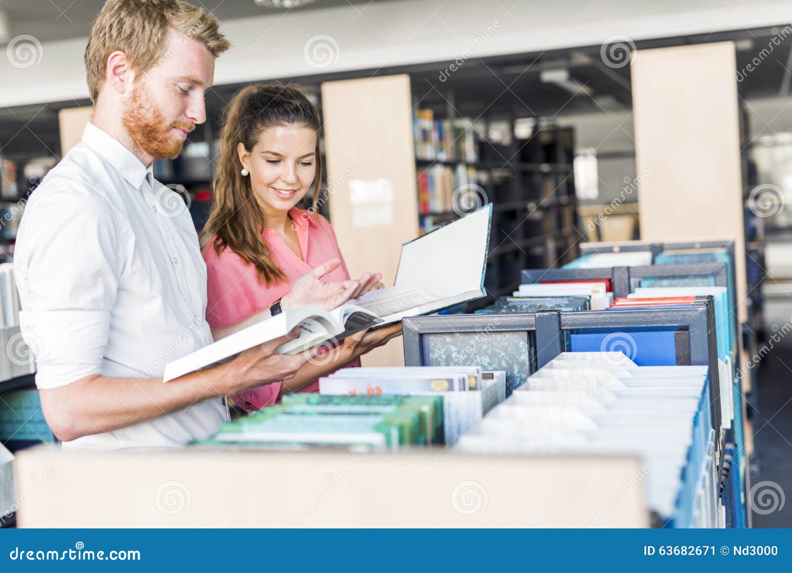 Two Students Reading and Studying in Library Stock Image - Image of ...