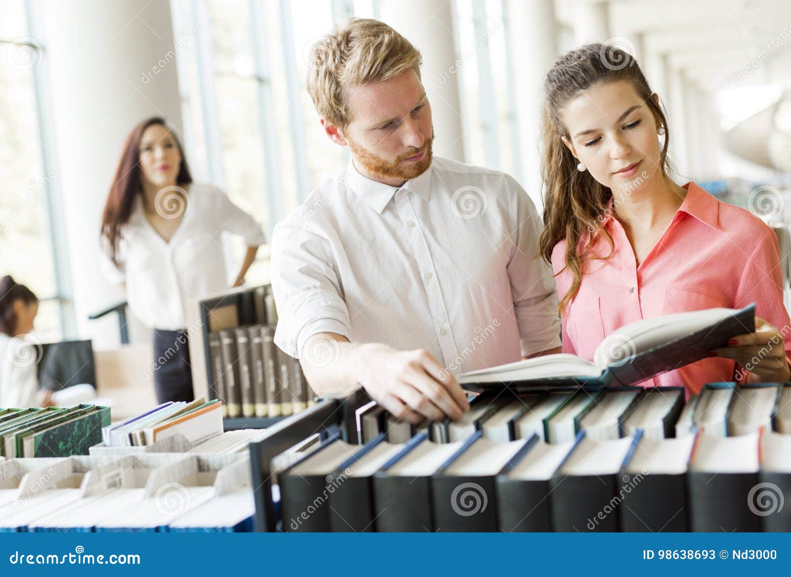 Two Students Reading and Studying in Library Stock Image - Image of ...