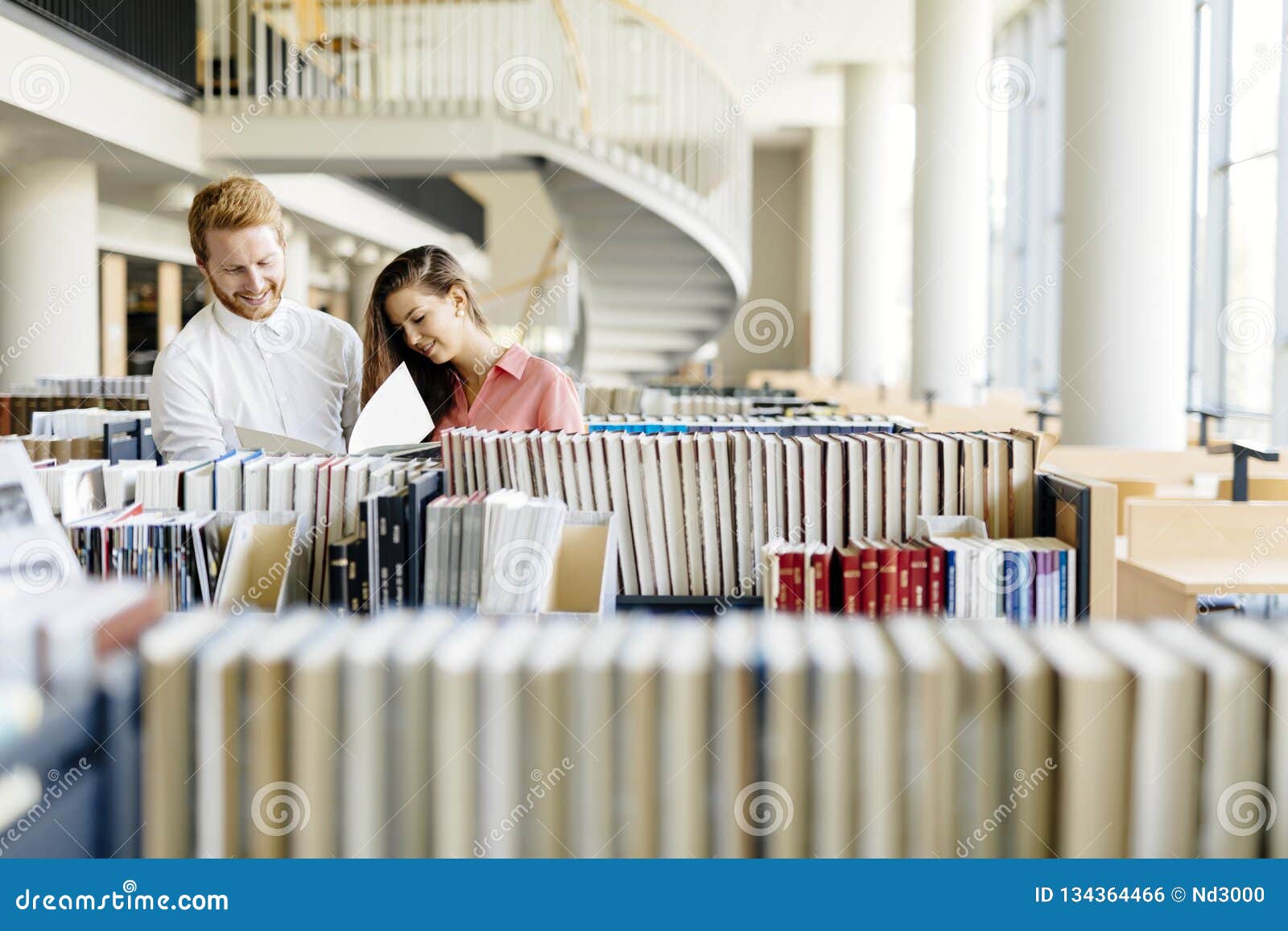 Two Students Reading and Studying in Library Stock Photo - Image of ...