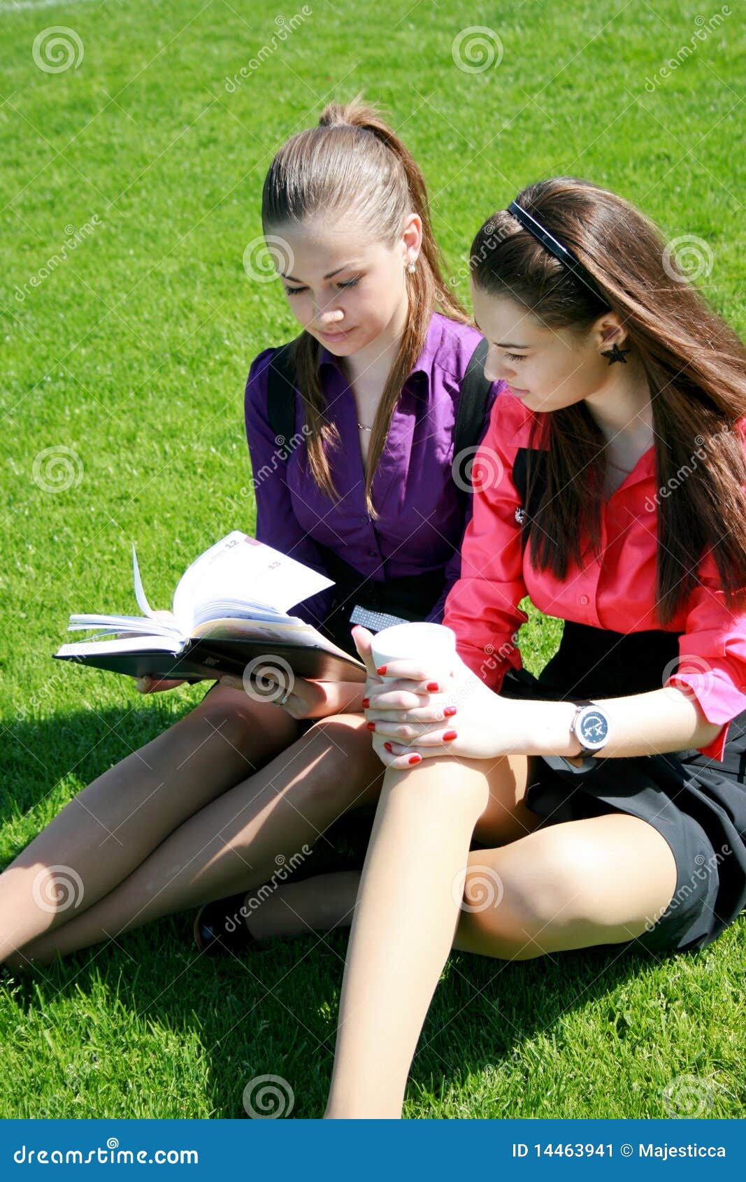 Two Students Relaxing on the Grass Stock Image - Image of pretty, girls ...