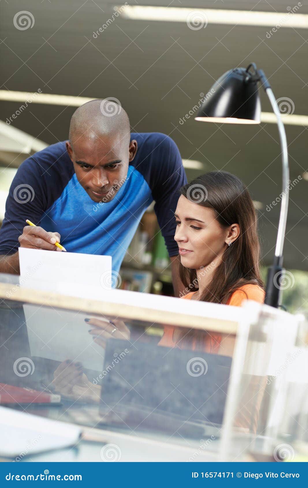 Two Students Reviewing Essay in Library Stock Image - Image of laptop ...