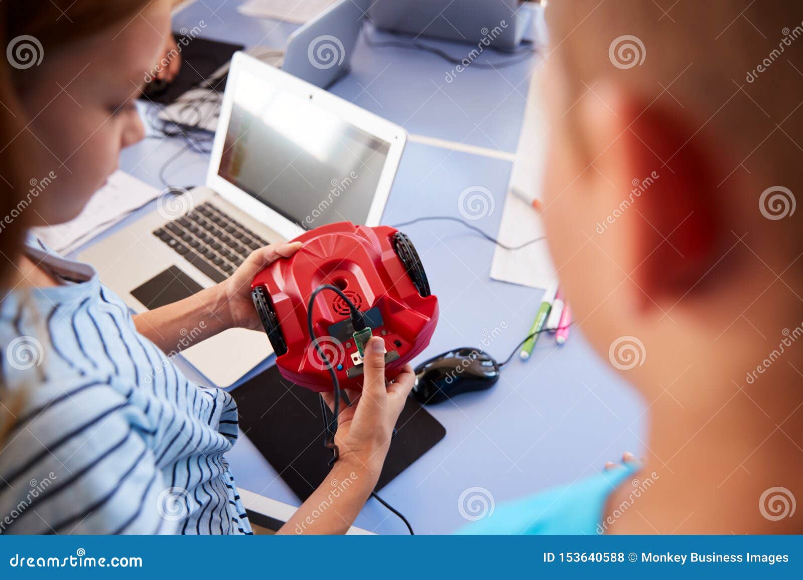 Two Students in after School Computer Coding Class Learning To Program Robot Vehicle Stock Photo ...