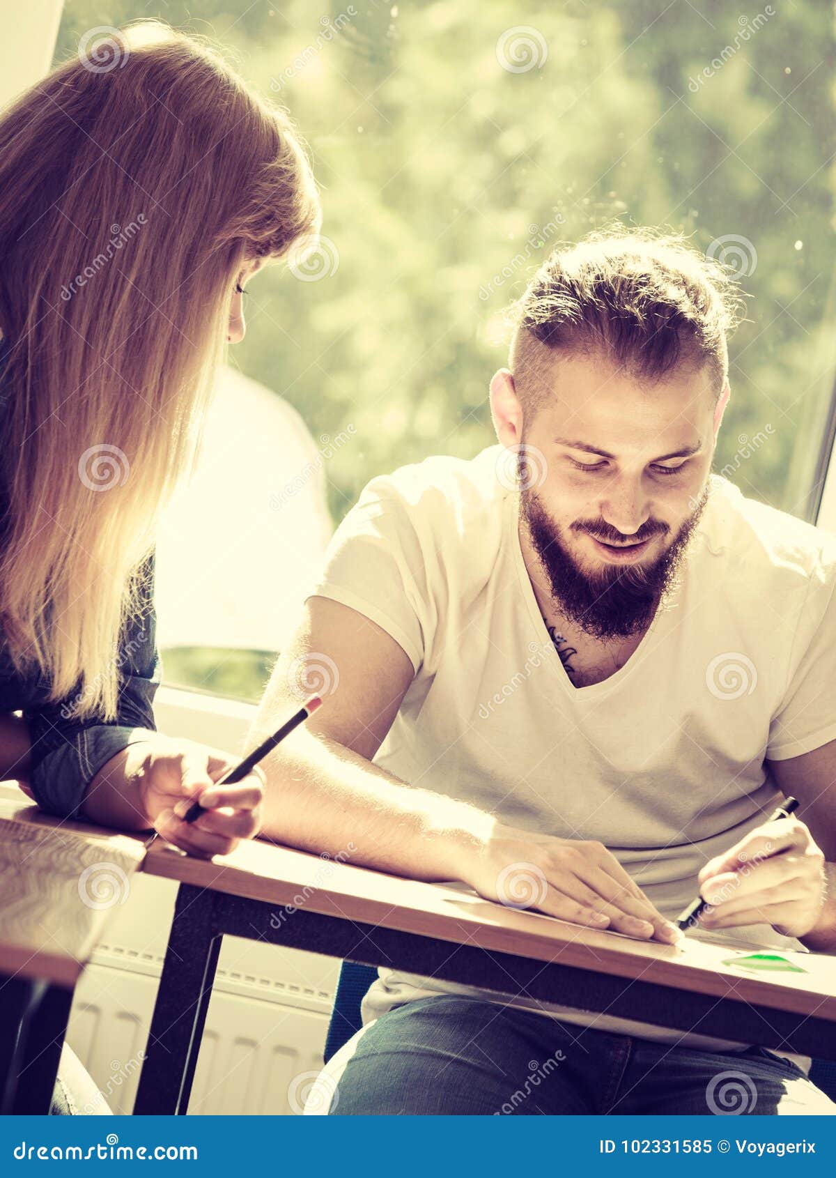 Two students in class stock image. Image of young, lecture - 102331585