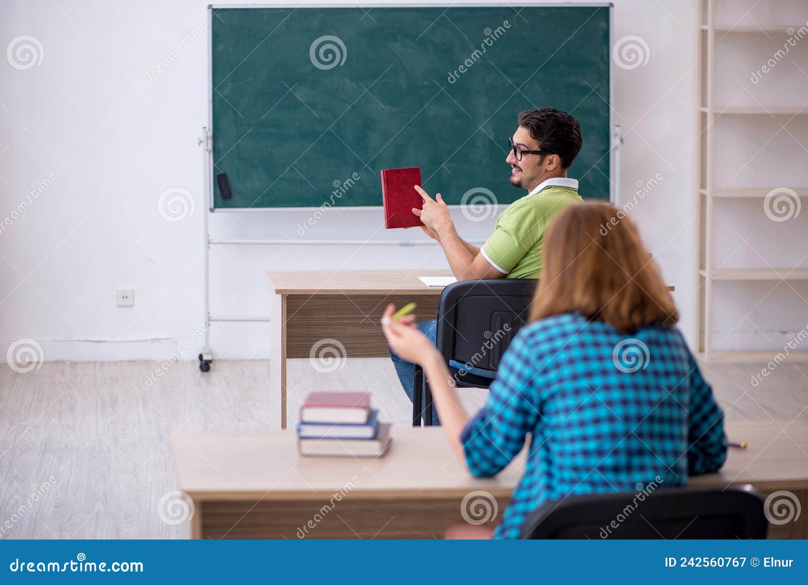 Two Students Sitting in the Classroom Stock Image - Image of presenting ...