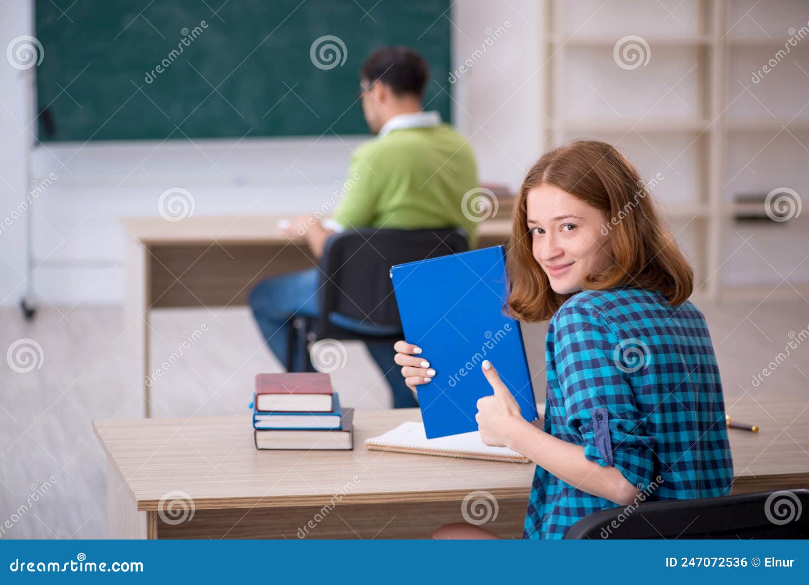 Two Students Sitting in the Classroom Stock Photo - Image of ...
