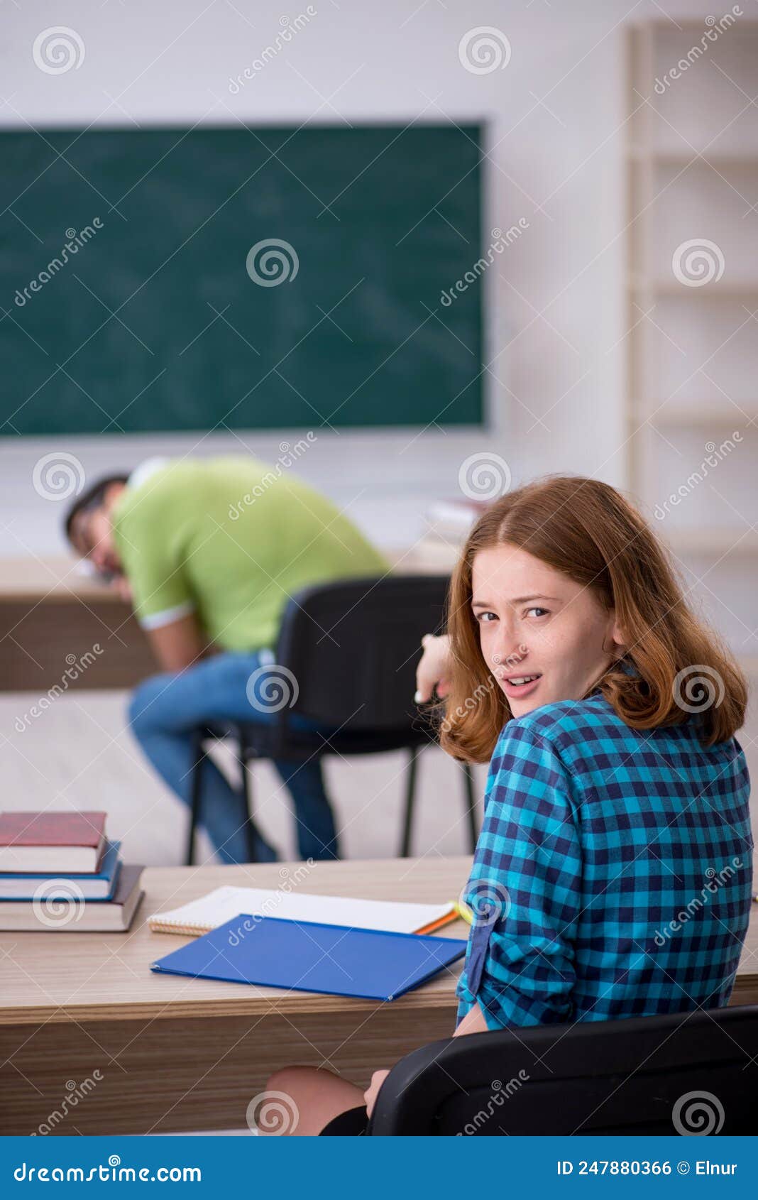 Two Students Sitting in the Classroom Stock Photo - Image of showing ...