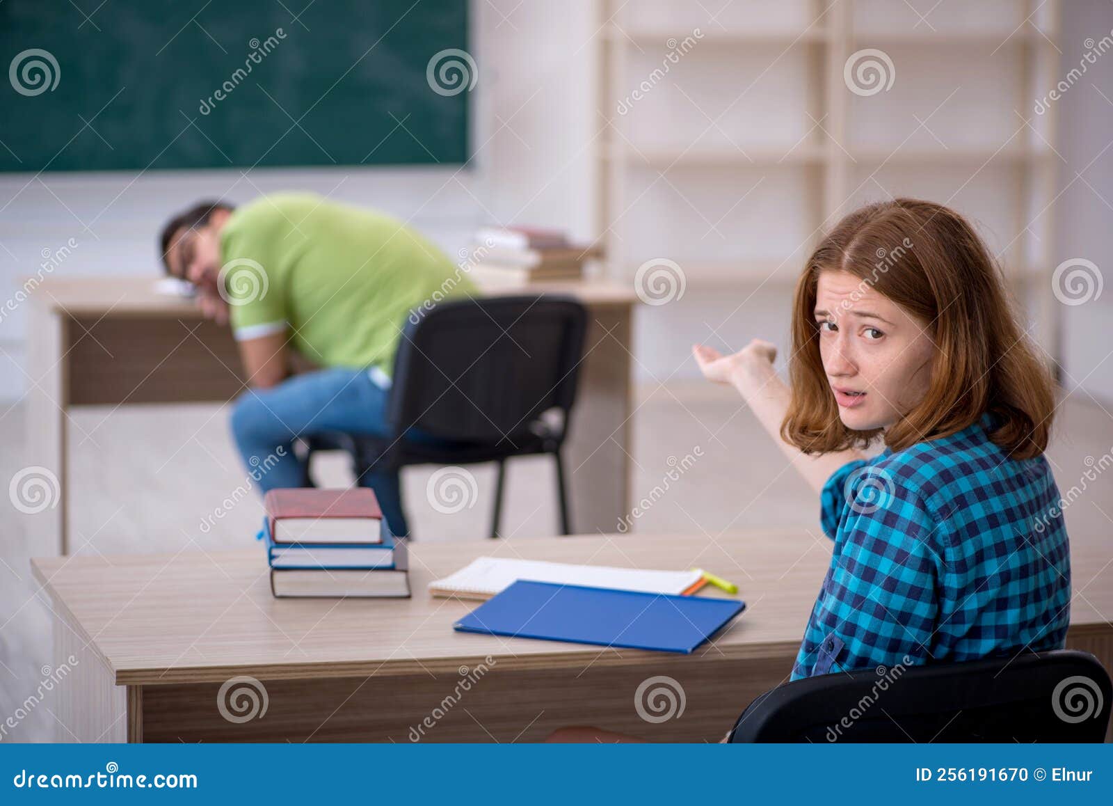 Two Students Sitting in the Classroom Stock Photo - Image of graduation ...