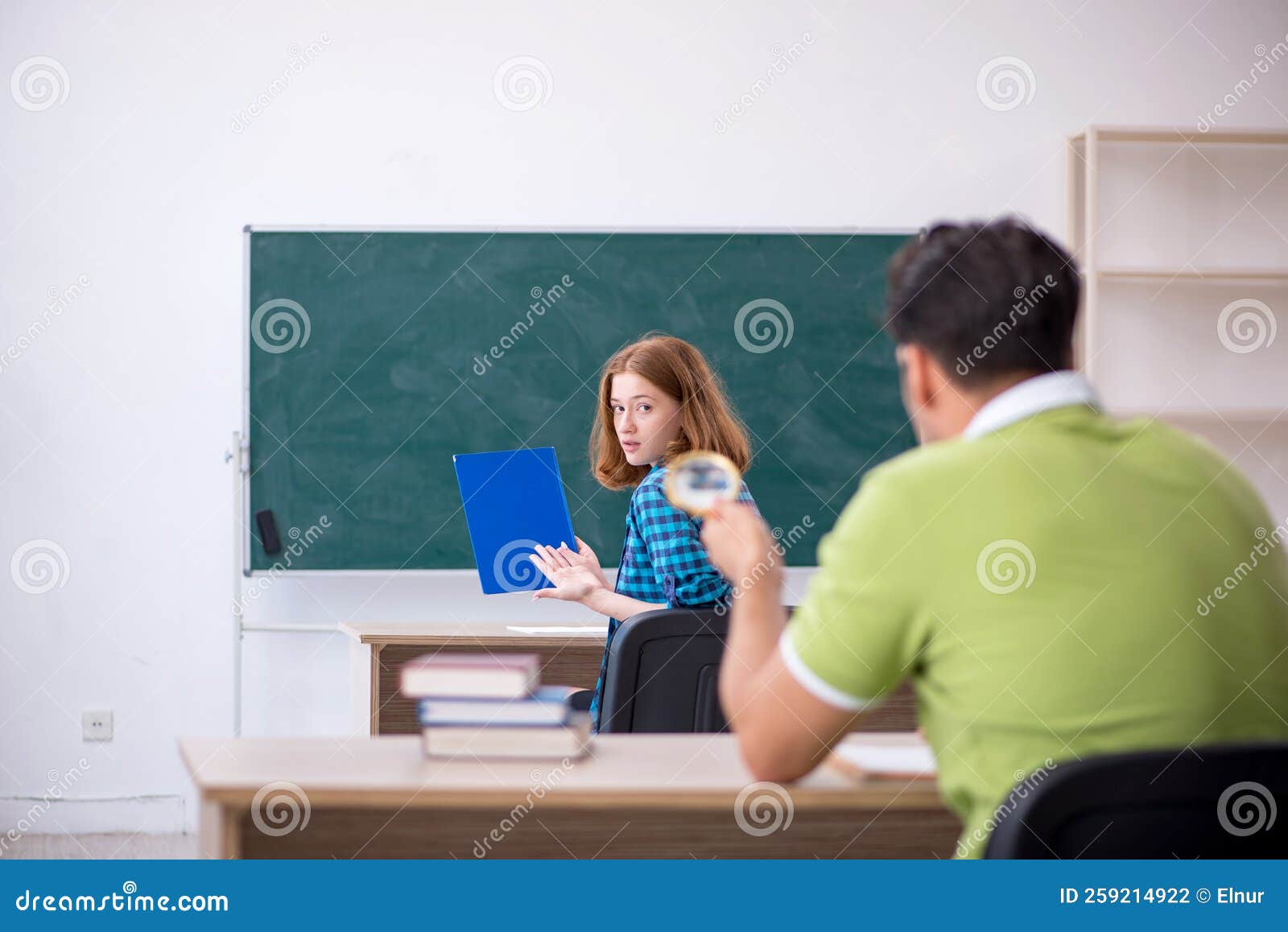 Two Students Sitting in the Classroom Stock Photo - Image of learning ...