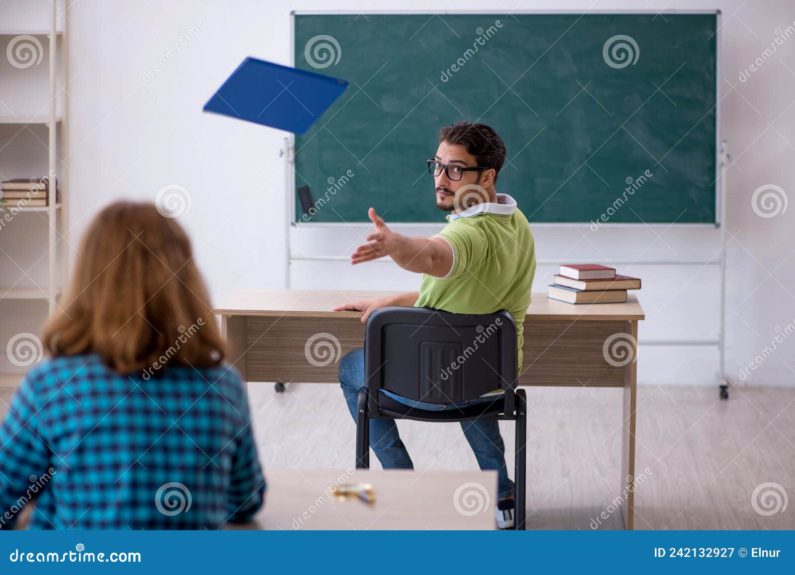 Two Students Sitting in the Classroom Stock Image - Image of exam ...