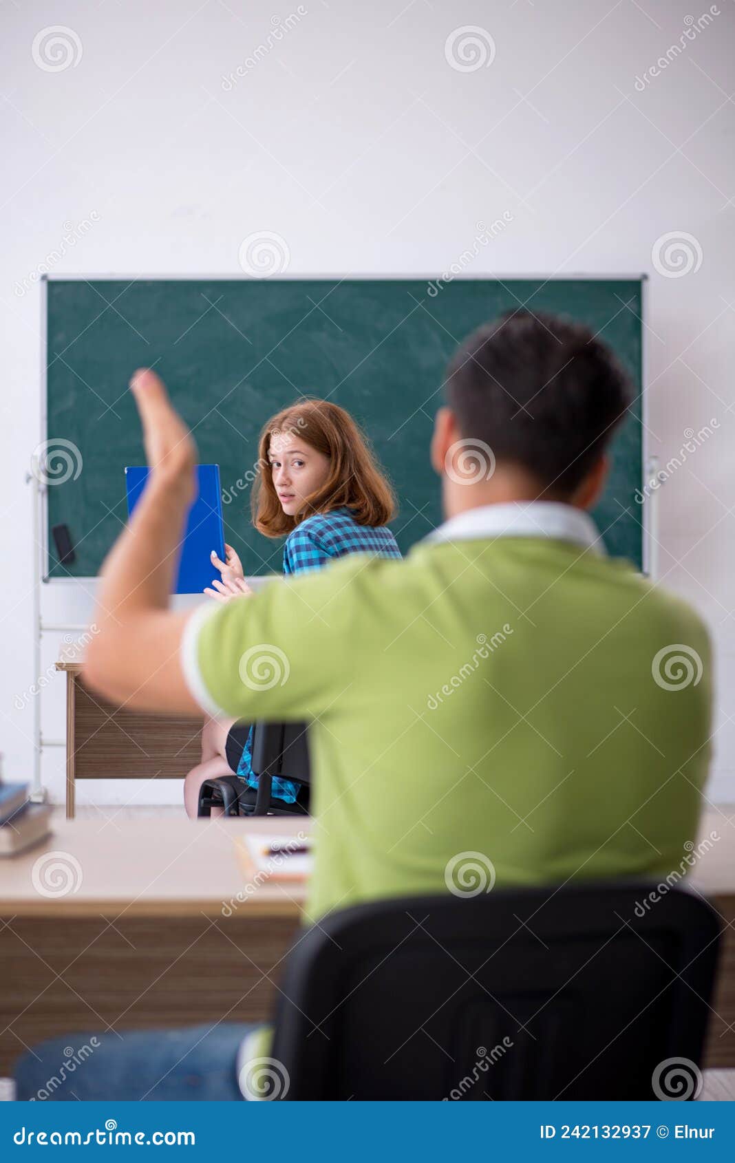 Two Students Sitting in the Classroom Stock Image - Image of exam ...