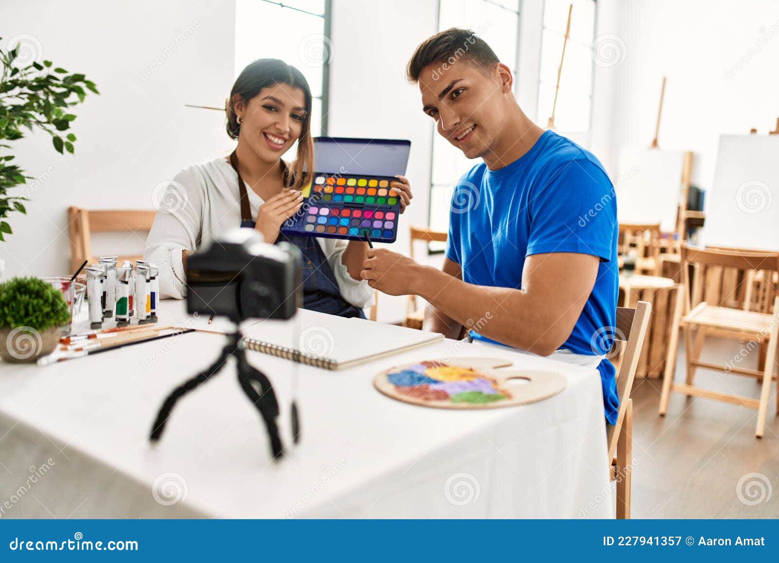 Two Students Smiling Happy Recording Paint Class Using Camera at Art ...