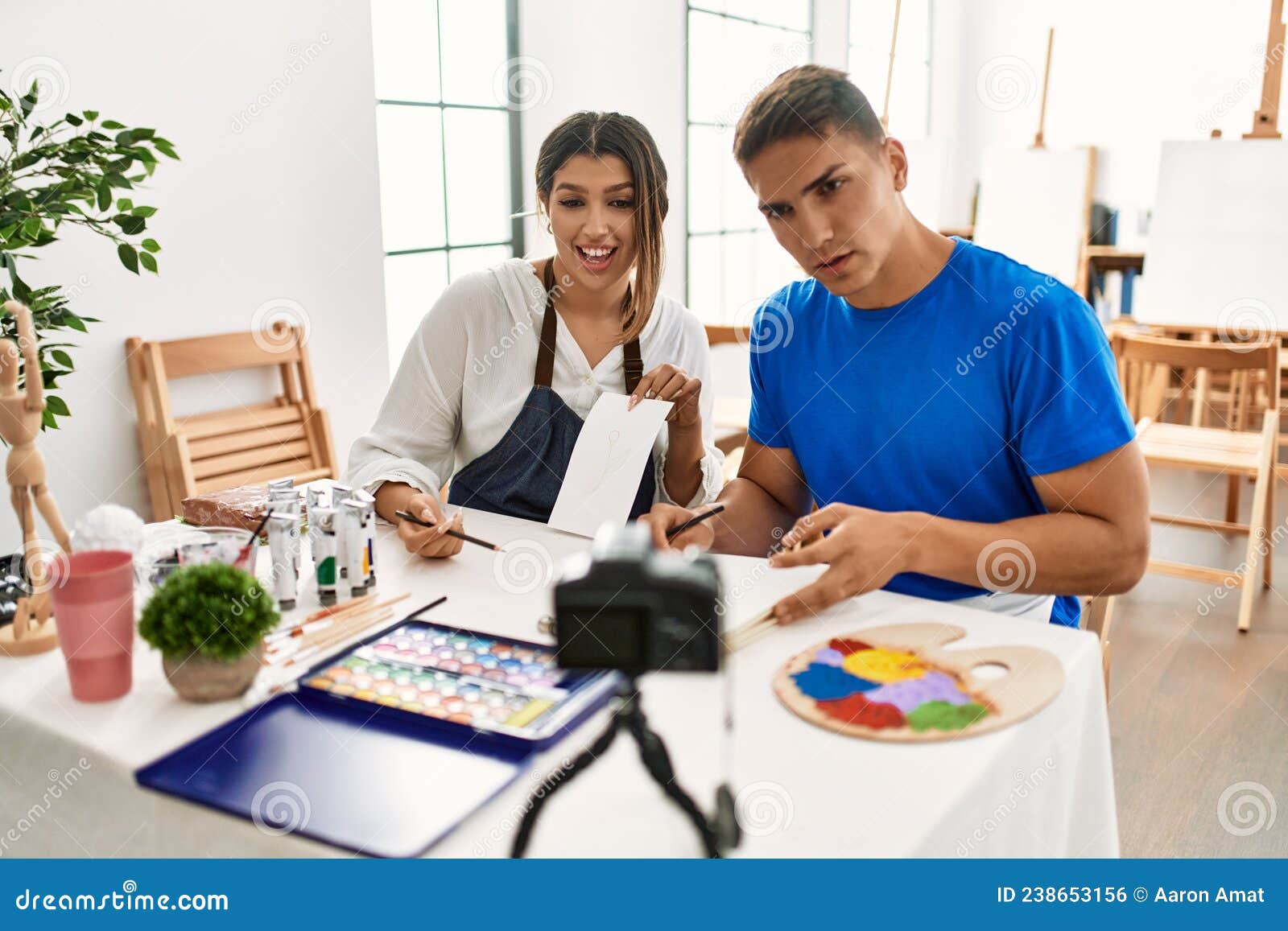Two Students Smiling Happy Recording Paint Class Using Camera at Art ...