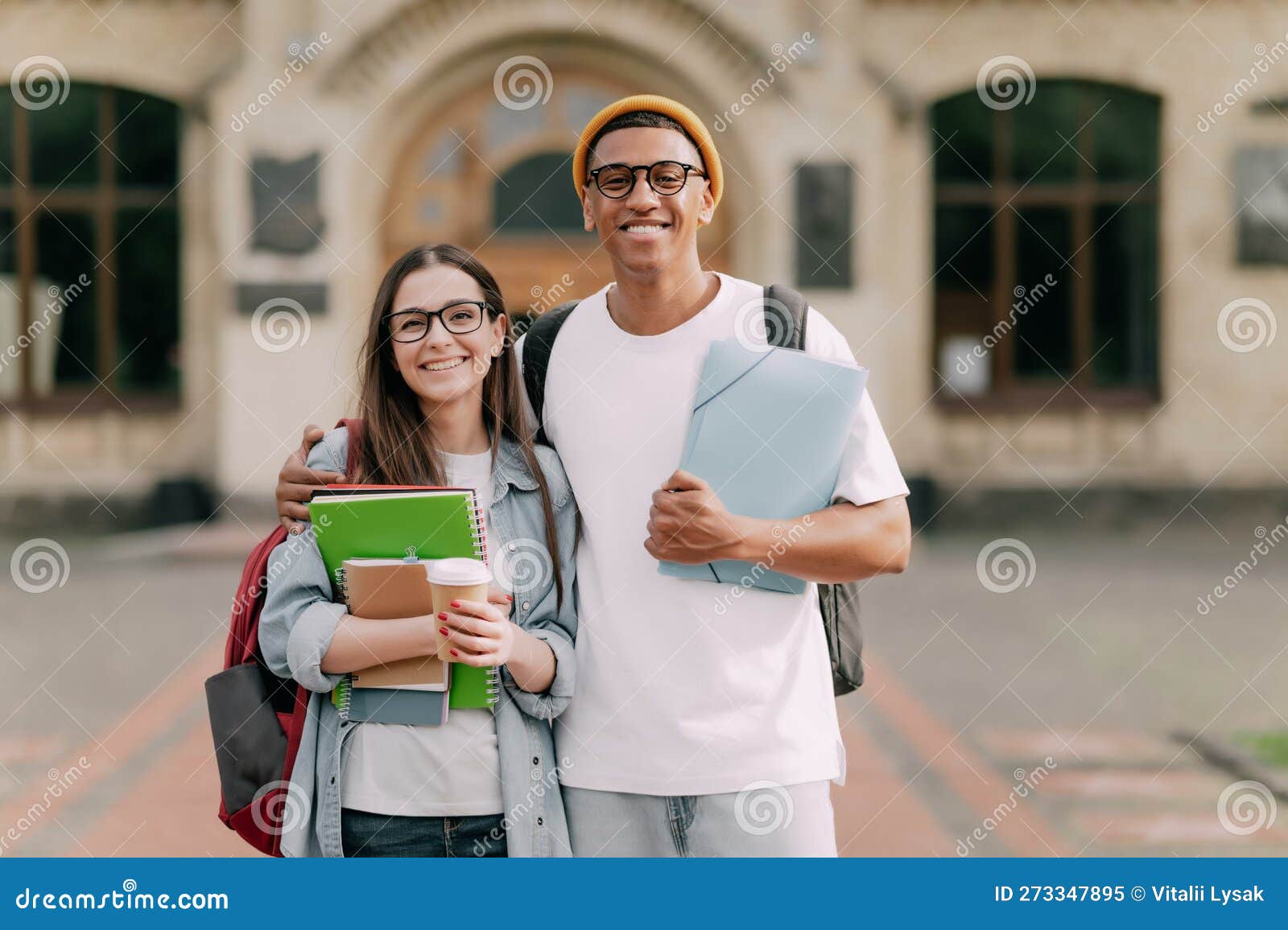 Two Students Standing Together Near the University, Outdoors, Looking ...