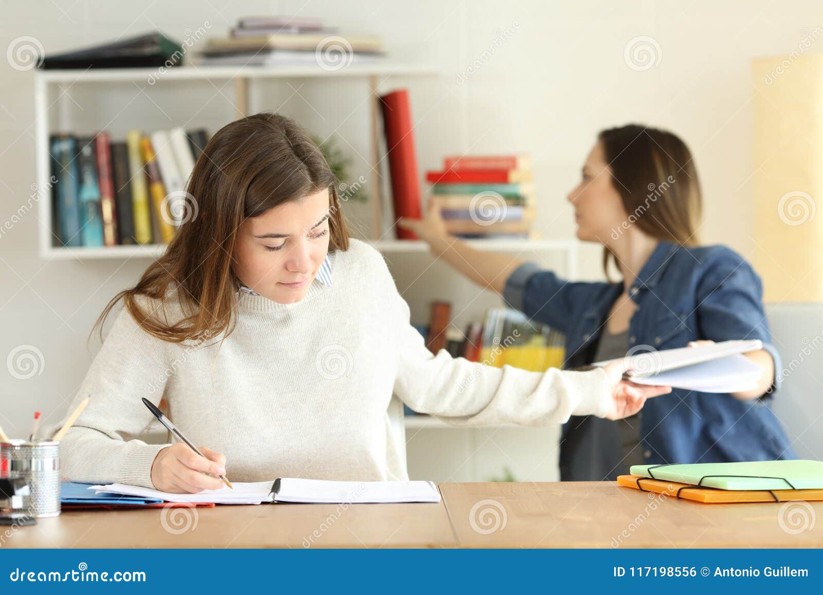 Two Students Studying Doing Homework at Home Stock Photo - Image of ...