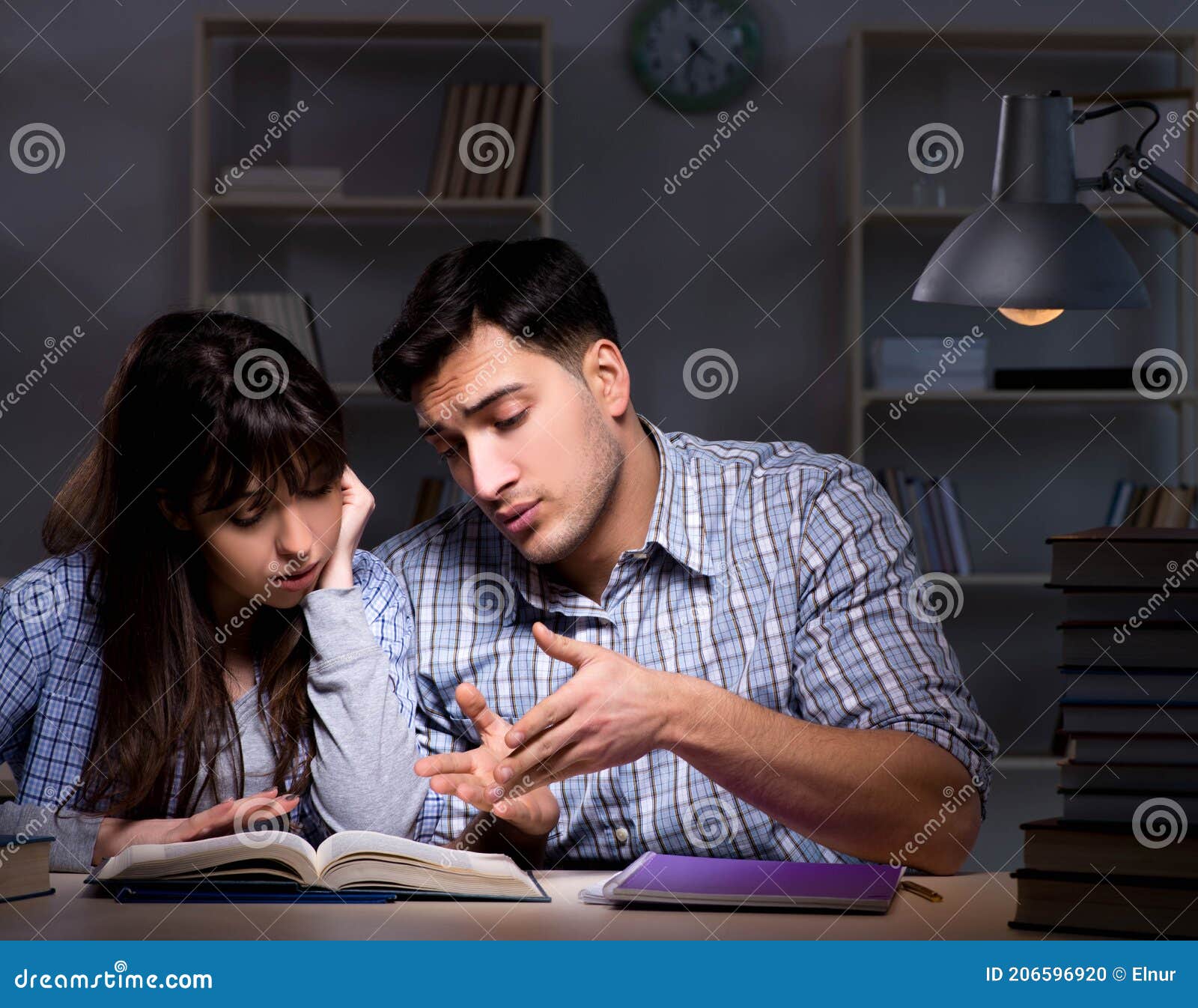 Two Students Studying Late at Night Stock Photo - Image of explaining ...
