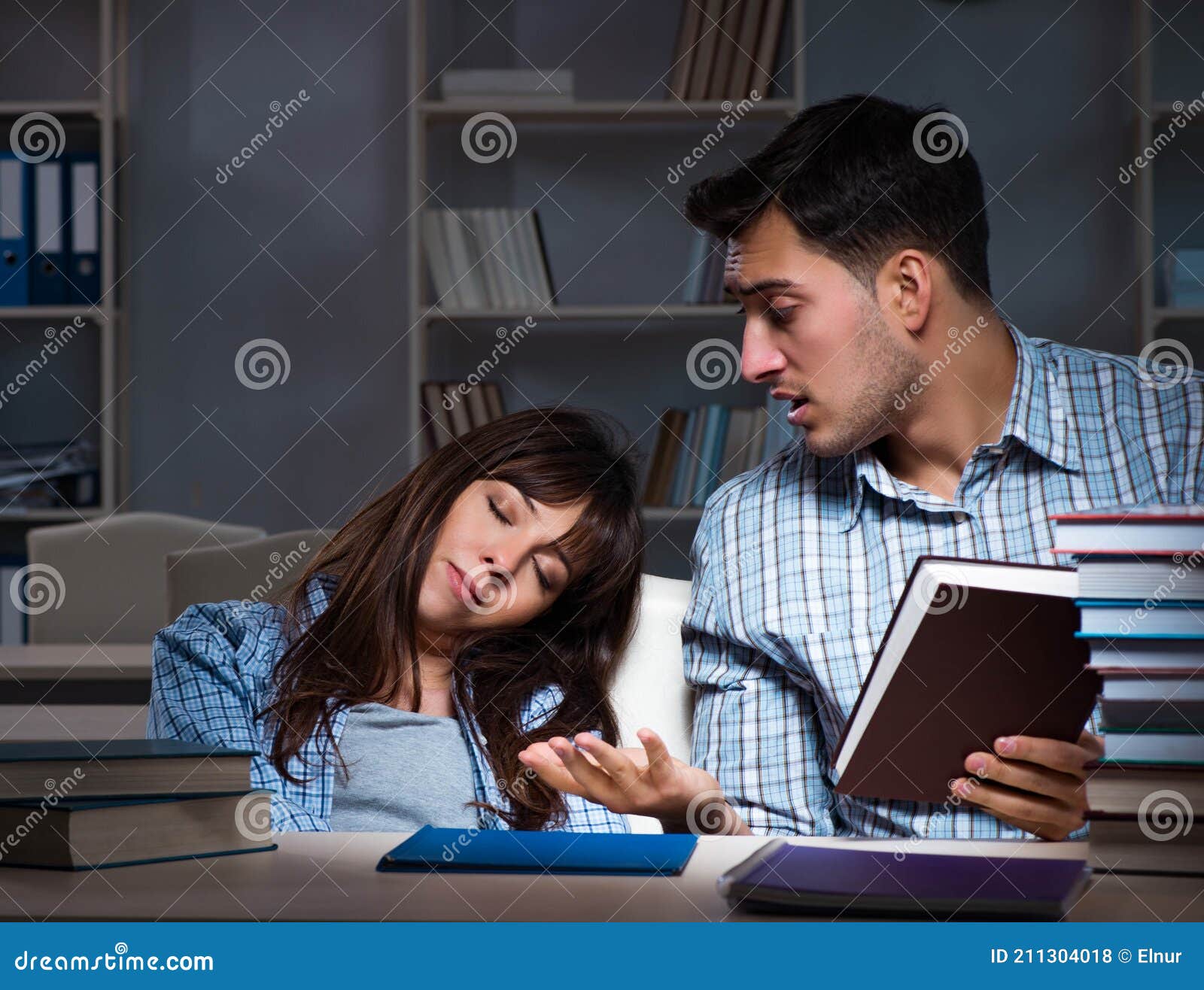 Two Students Studying Late at Night Stock Photo - Image of reading ...